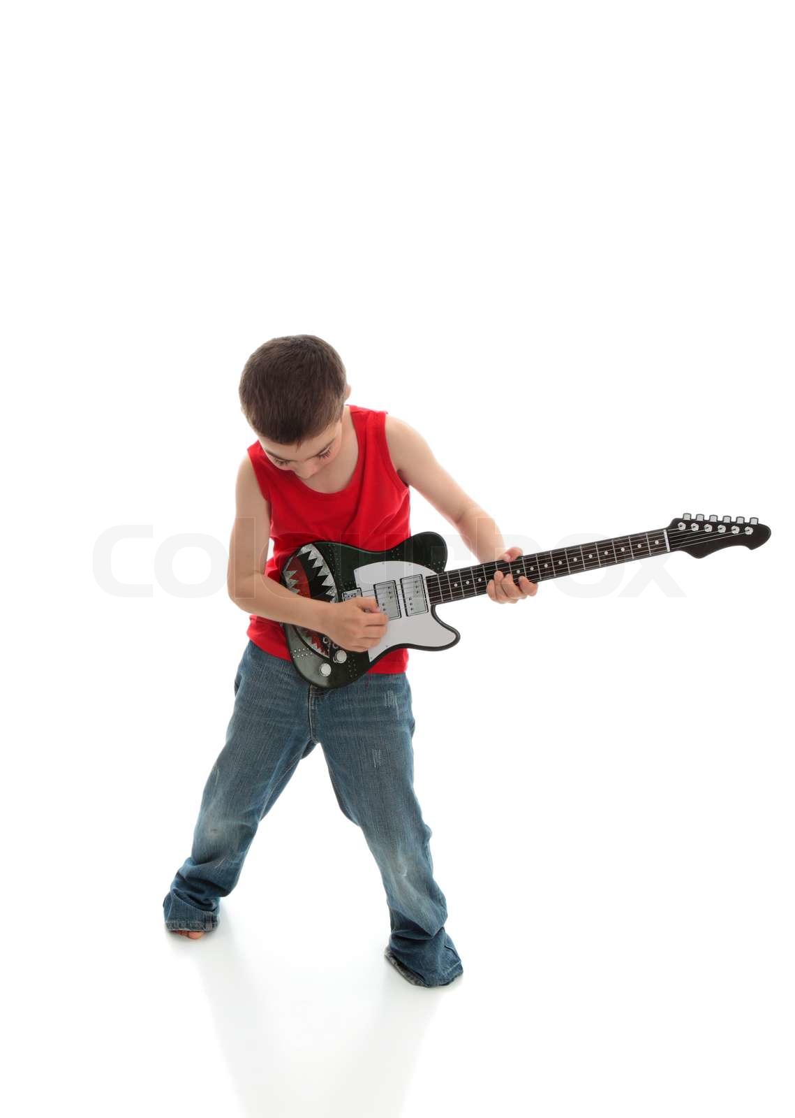 Little boy playing a guitar | Stock image | Colourbox