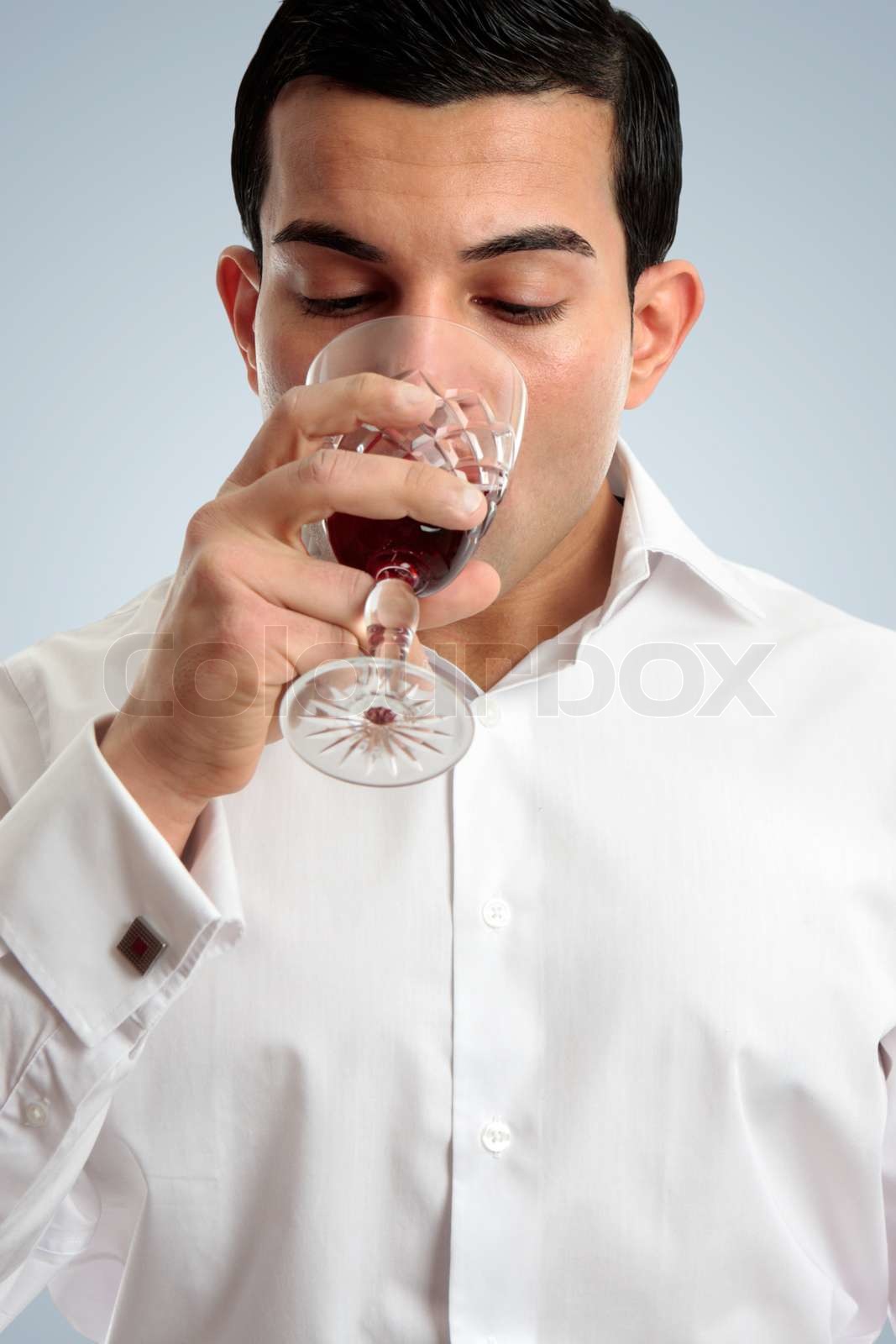 Man tasting drinking wine | Stock image | Colourbox