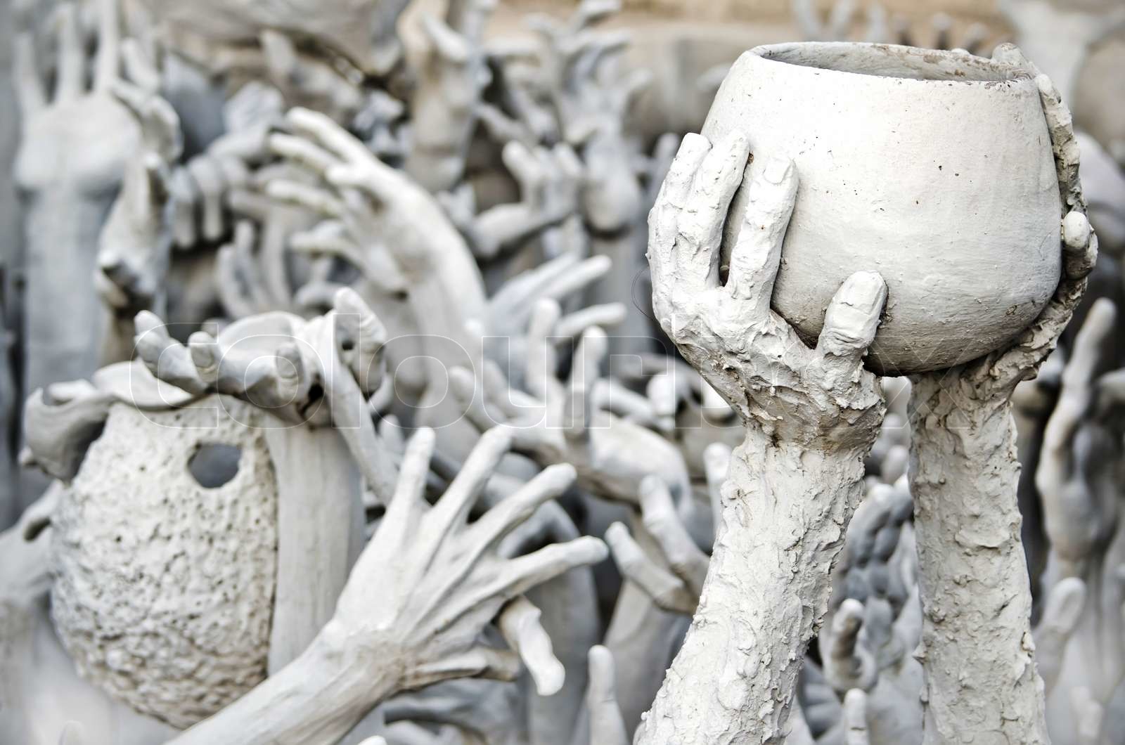 Hands statue from hell | Stock image | Colourbox