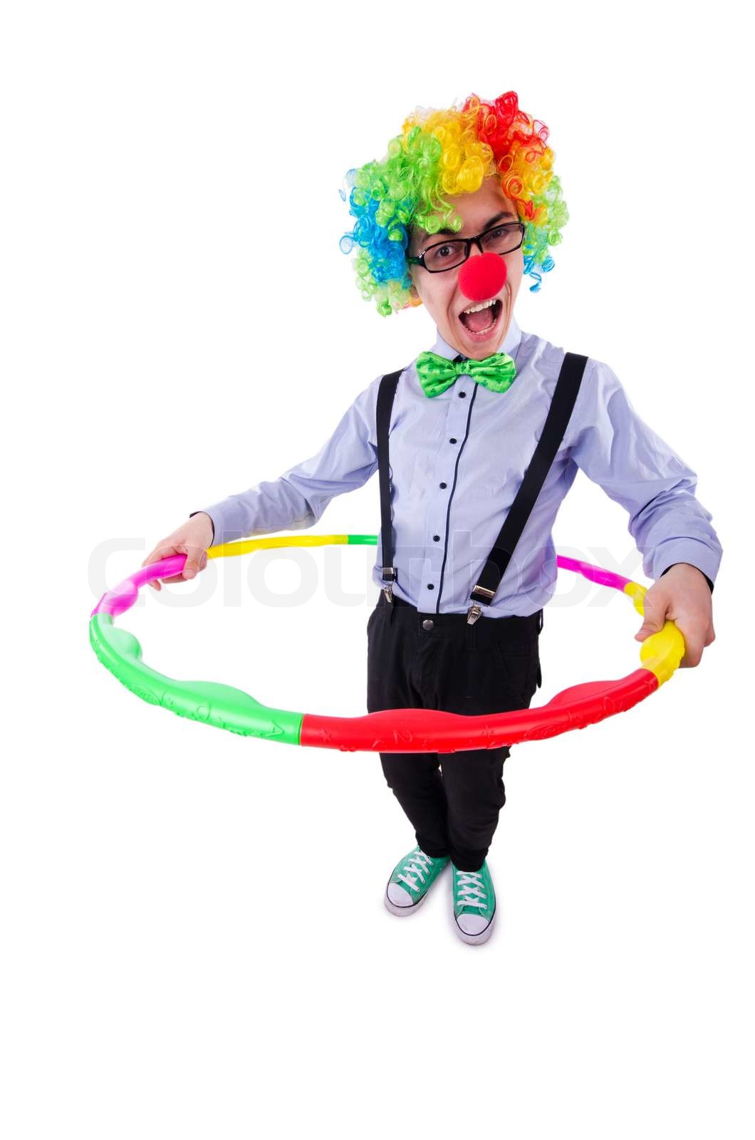 Lustiger Clown mit Hula-Hoop auf weißem | Stock Bild | Colourbox