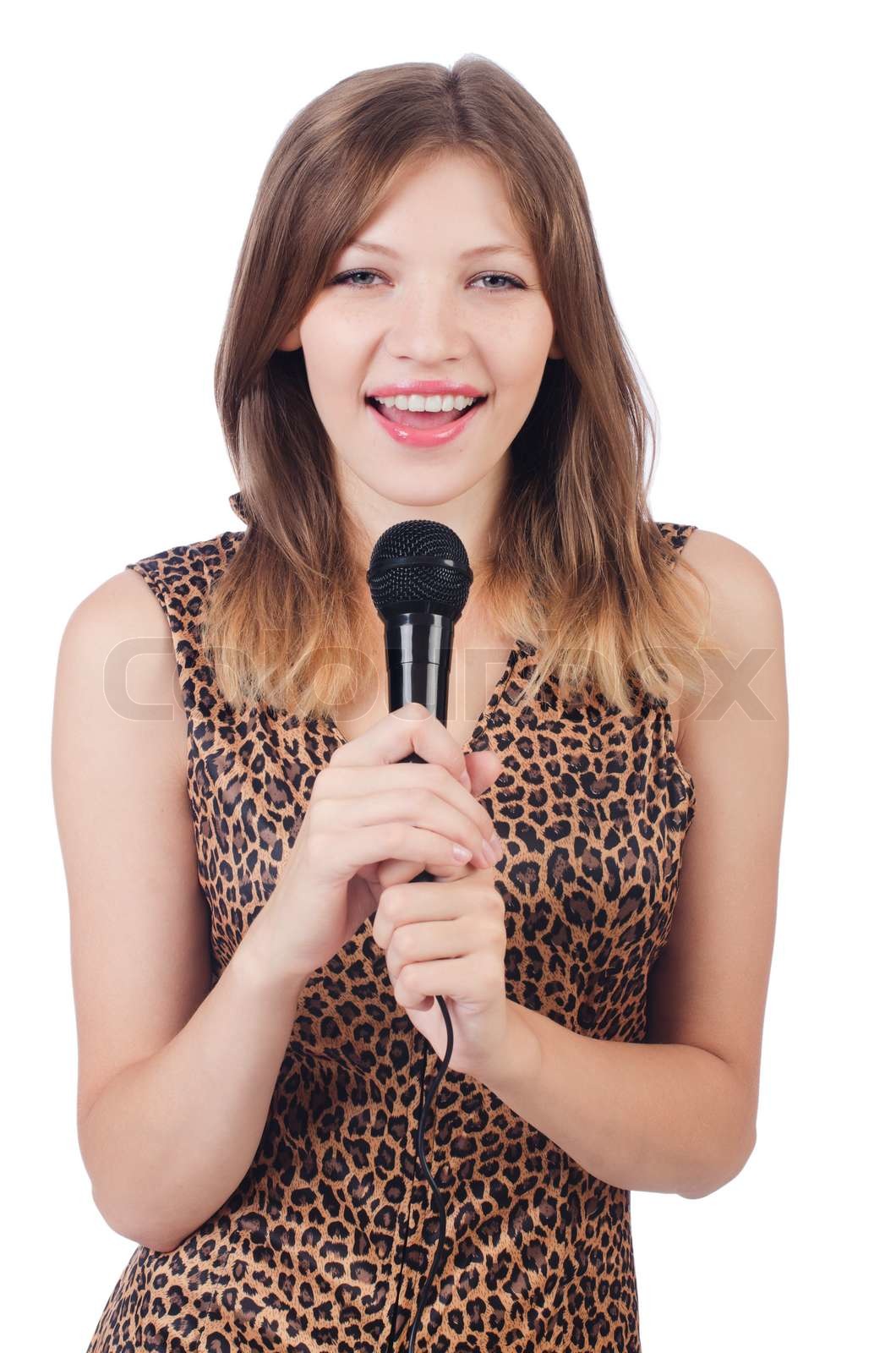 Woman singer with microphone on white | Stock image | Colourbox