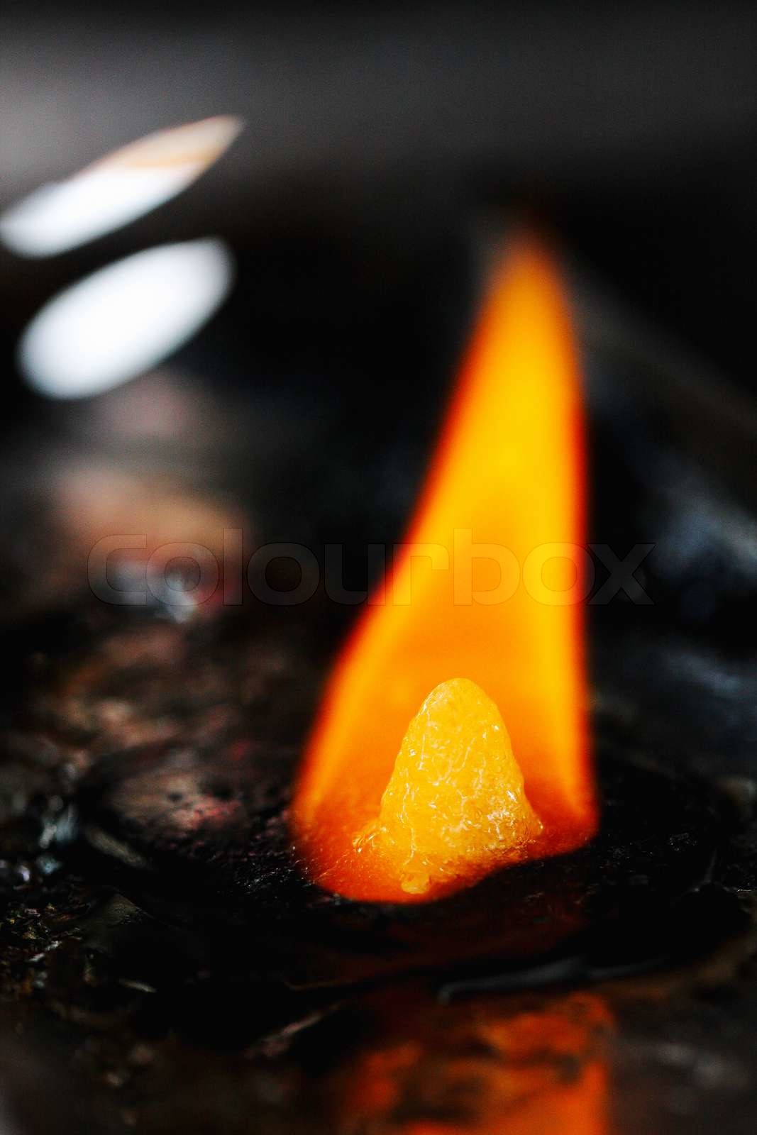 Lantern light with flames | Stock image | Colourbox