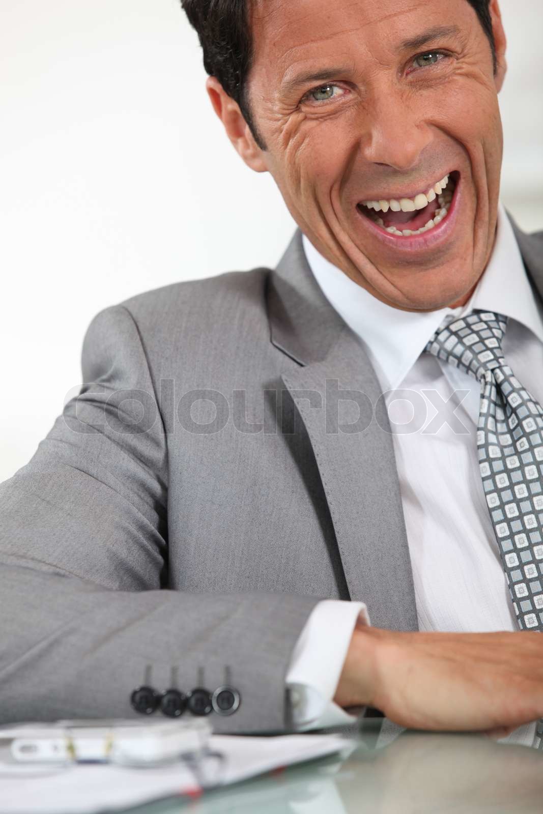 Office manager laughing | Stock image | Colourbox