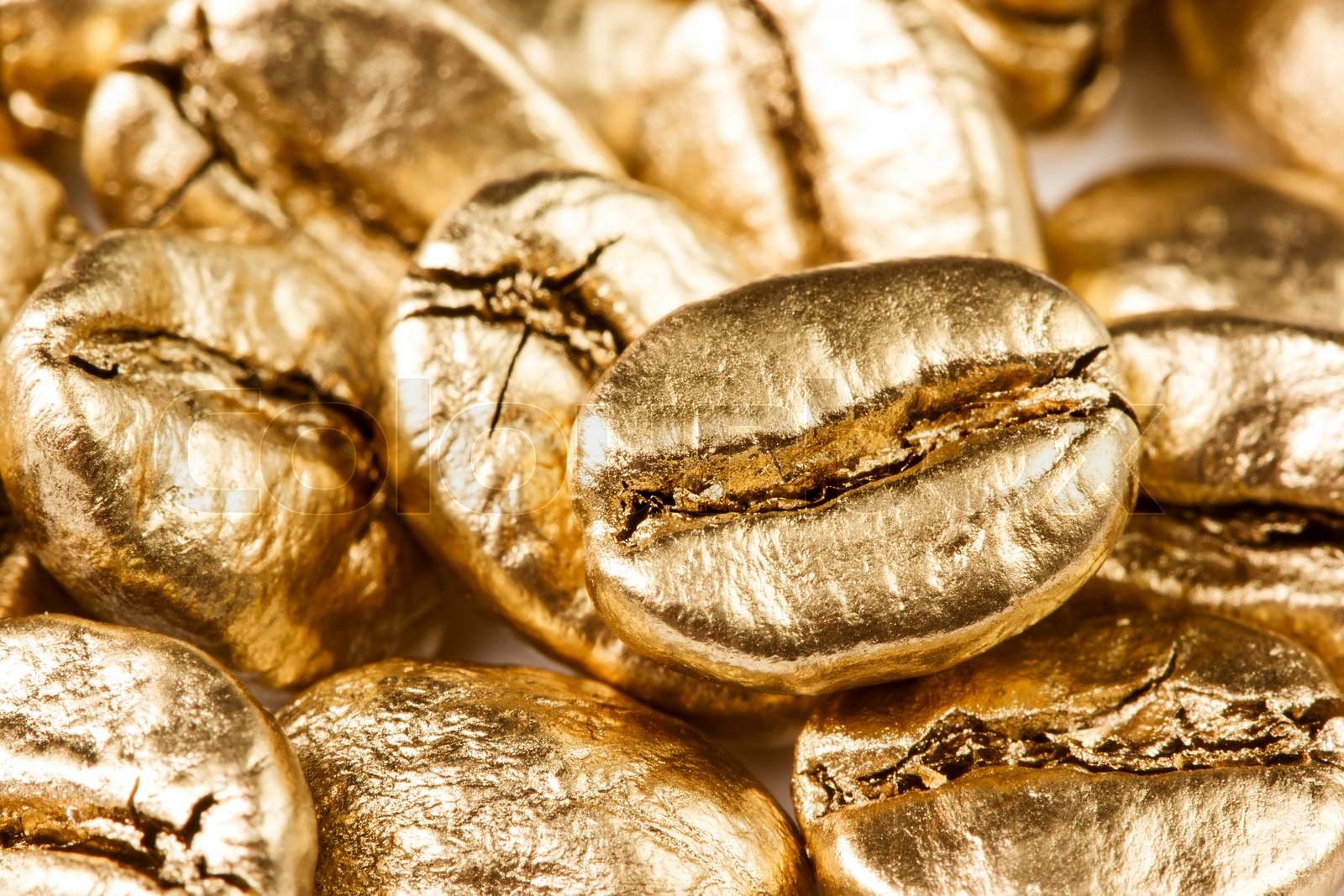 Gold coffee beans | Stock image | Colourbox