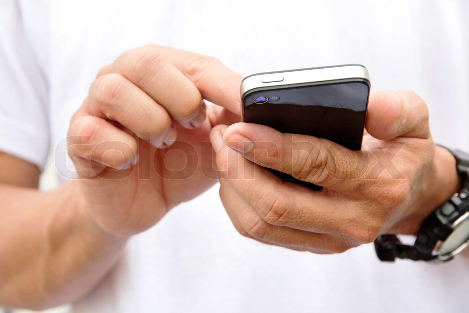 man checking his phone | Stock image | Colourbox