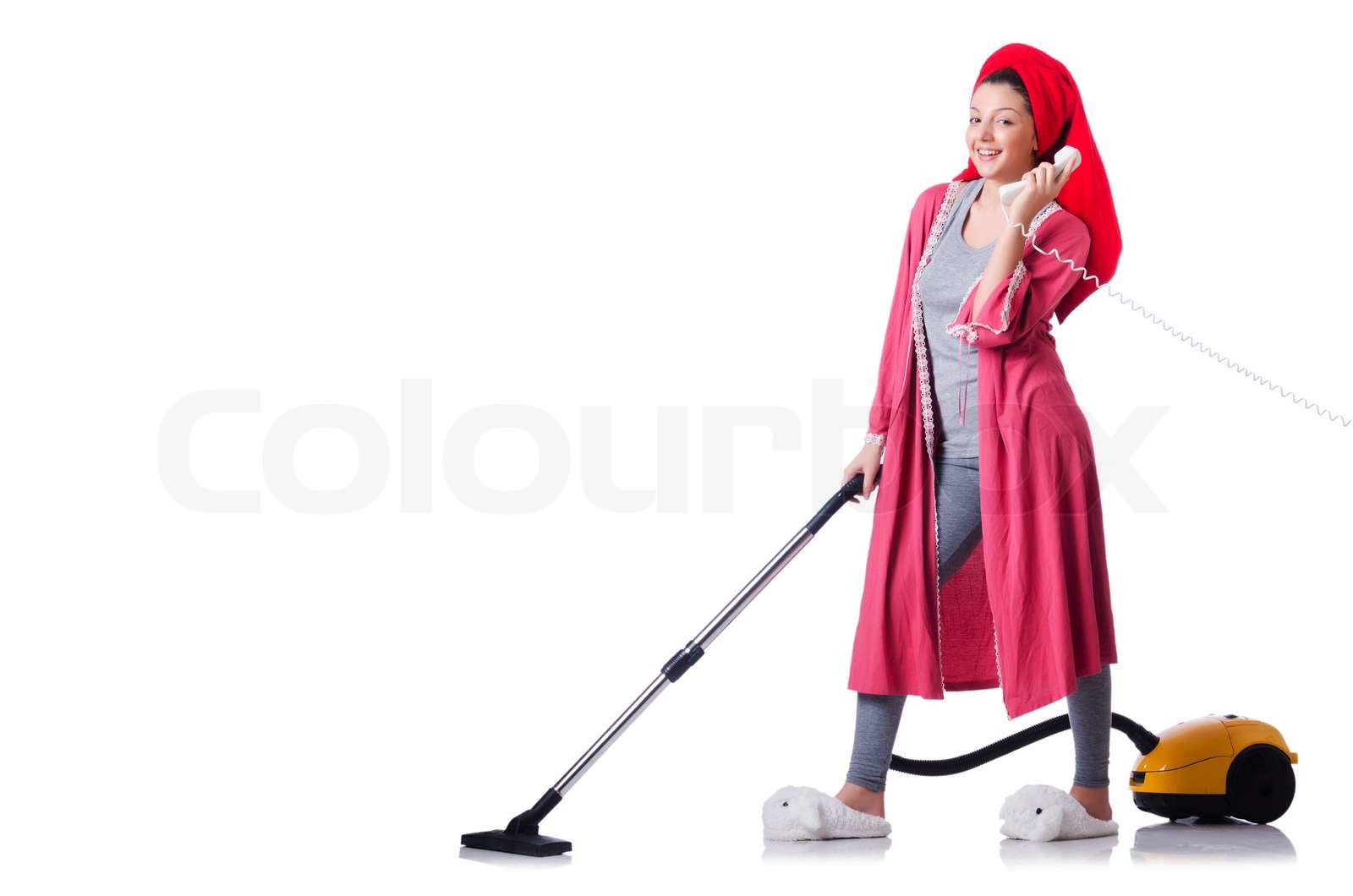 Housewife with vacuum cleaner on white | Stock image | Colourbox