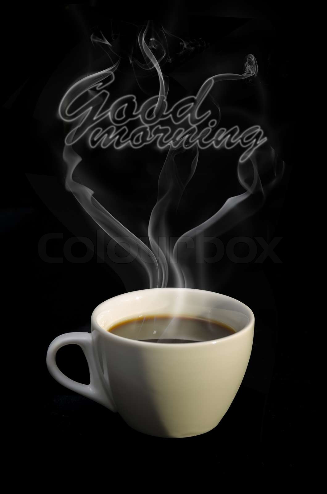 Kop varm kaffe med Godmorgen damp på mørk baggrund | Stock foto | Colourbox