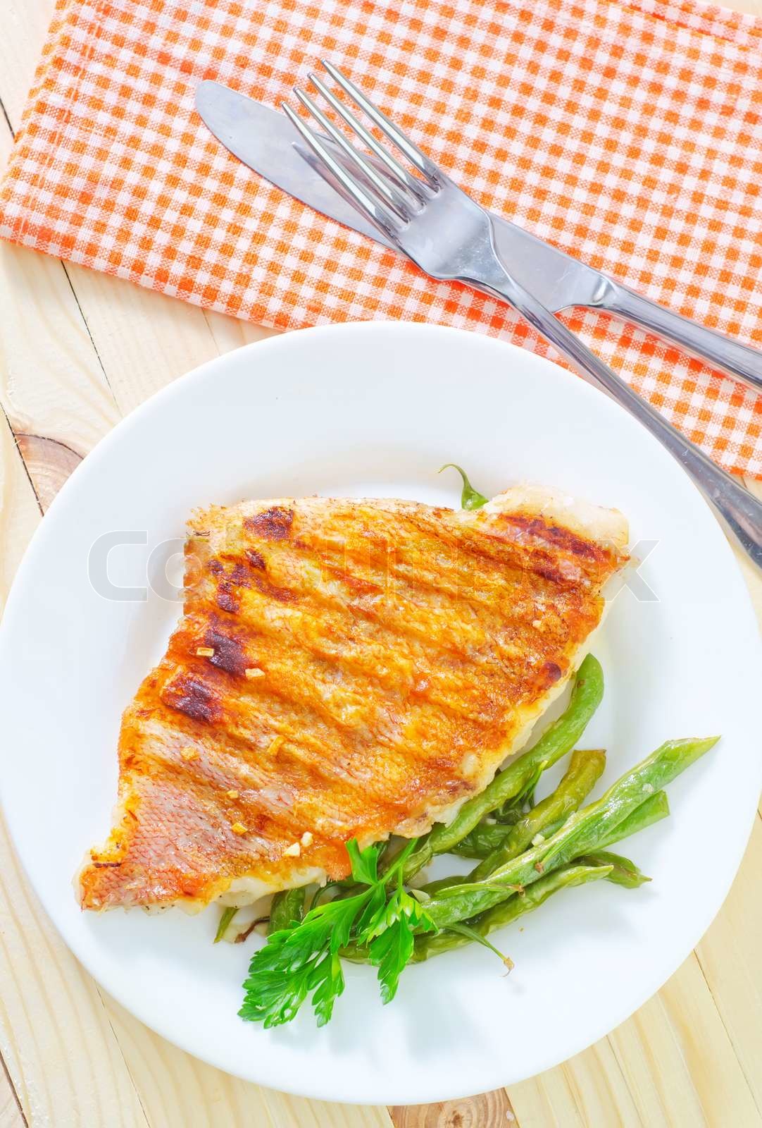 fried fish with green beans | Stock image | Colourbox
