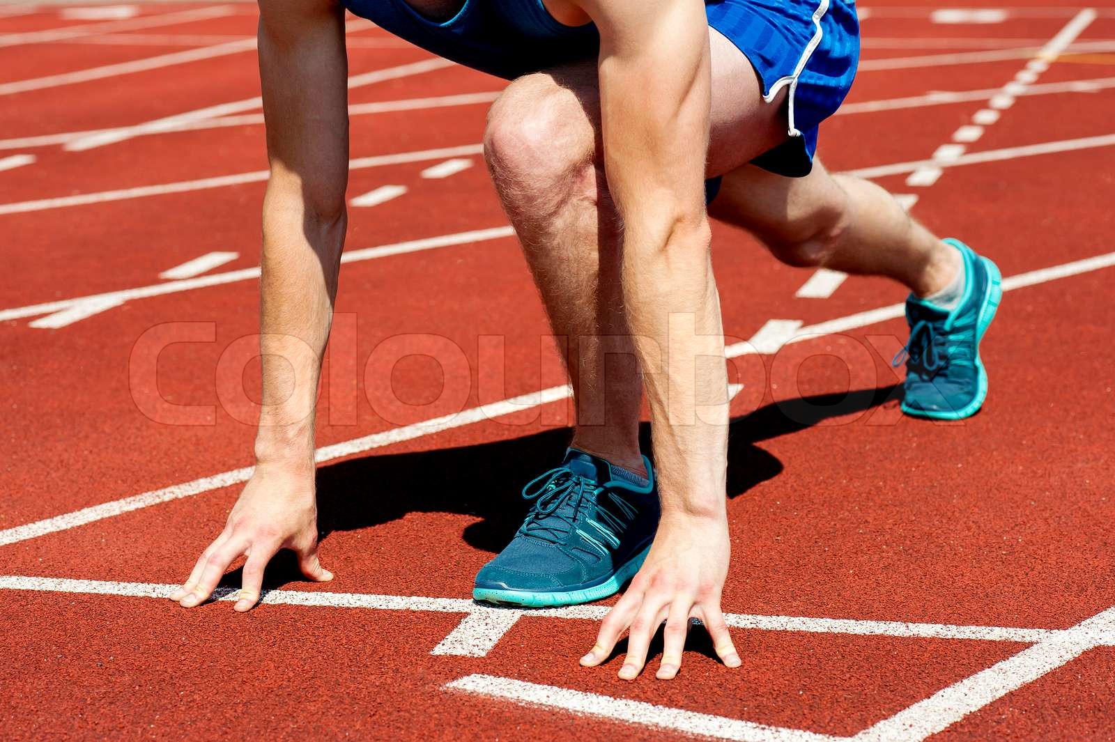 Runner getting ready for the race | Stock image | Colourbox