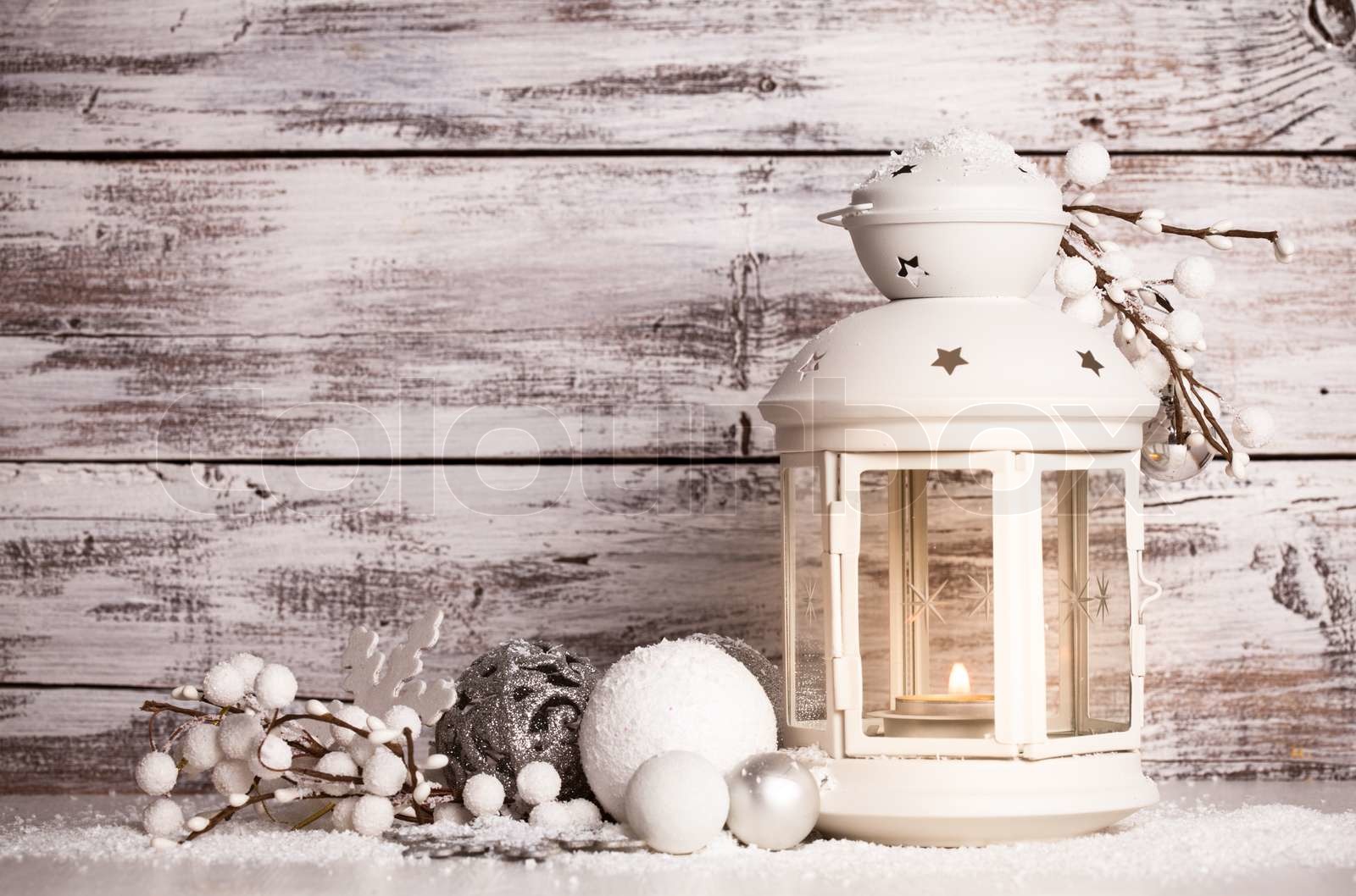 Cristmas lantern with snow | Stock image | Colourbox