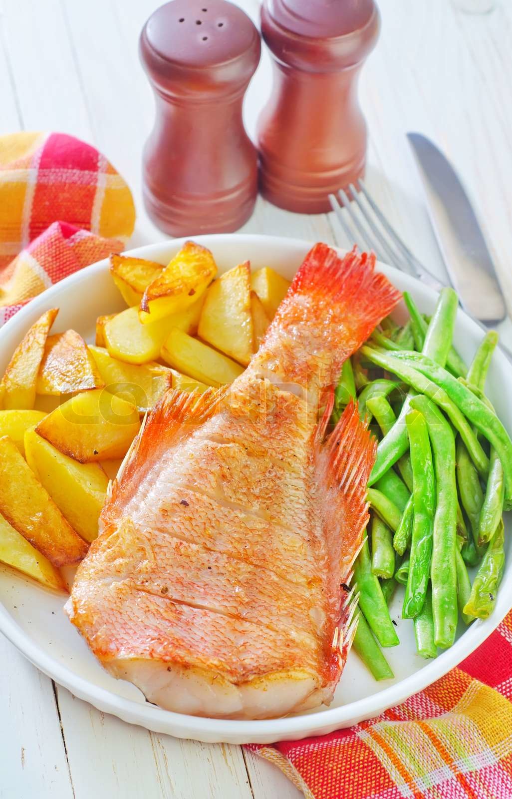 fried fish, potato and green beans | Stock image | Colourbox