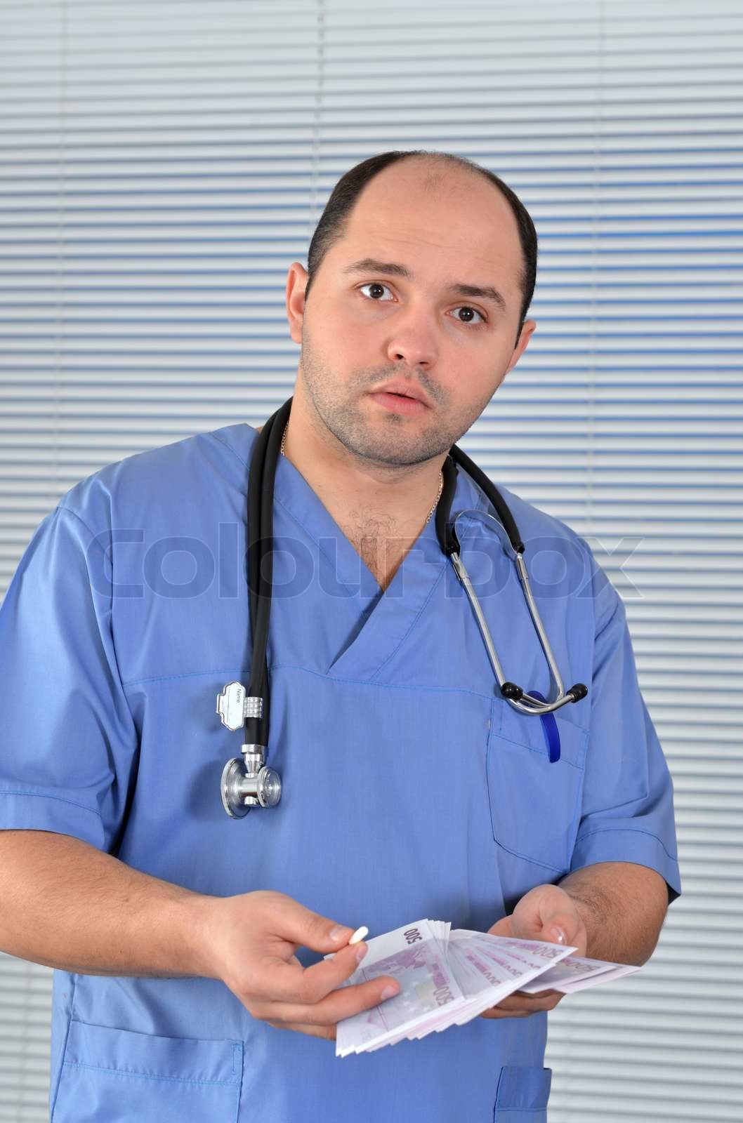 doctor in blue uniform | Stock image | Colourbox