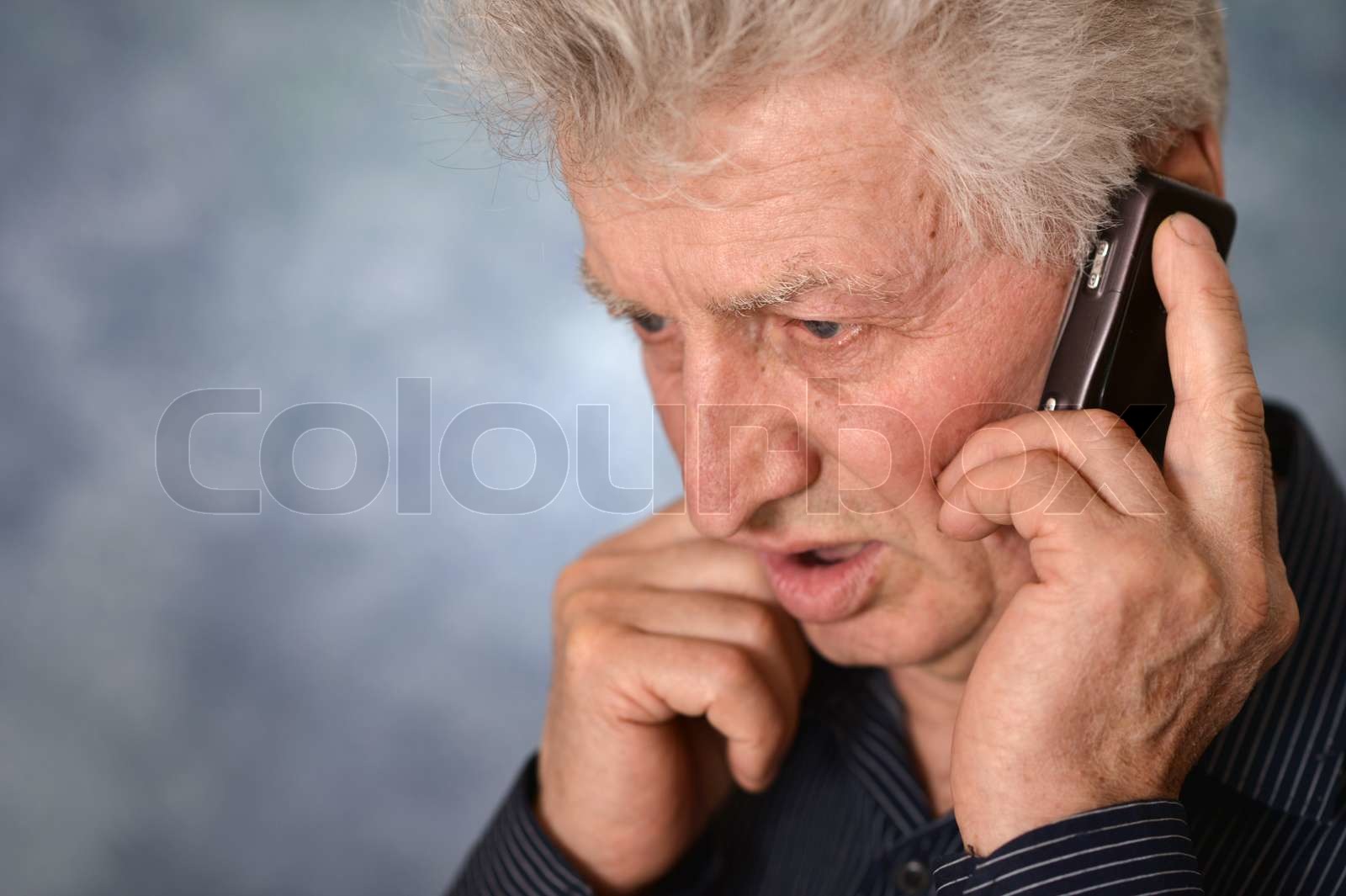 older man calling | Stock image | Colourbox
