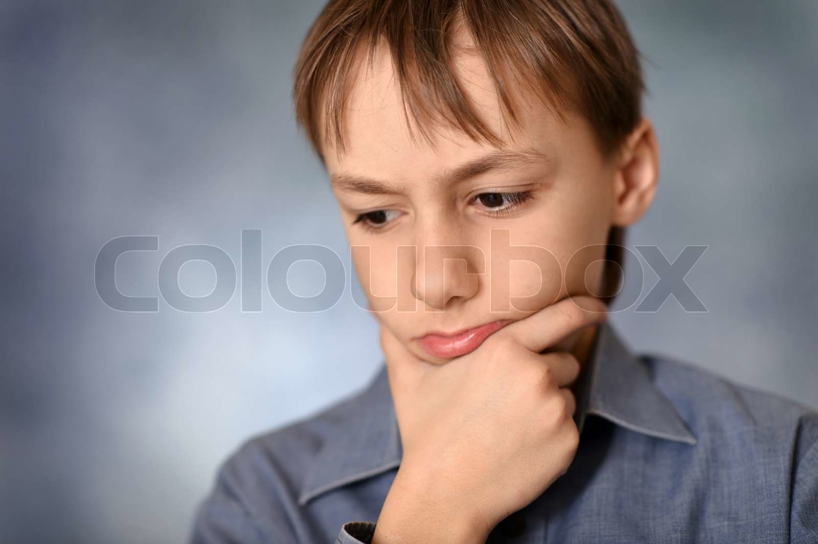 pensive little boy | Stock image | Colourbox