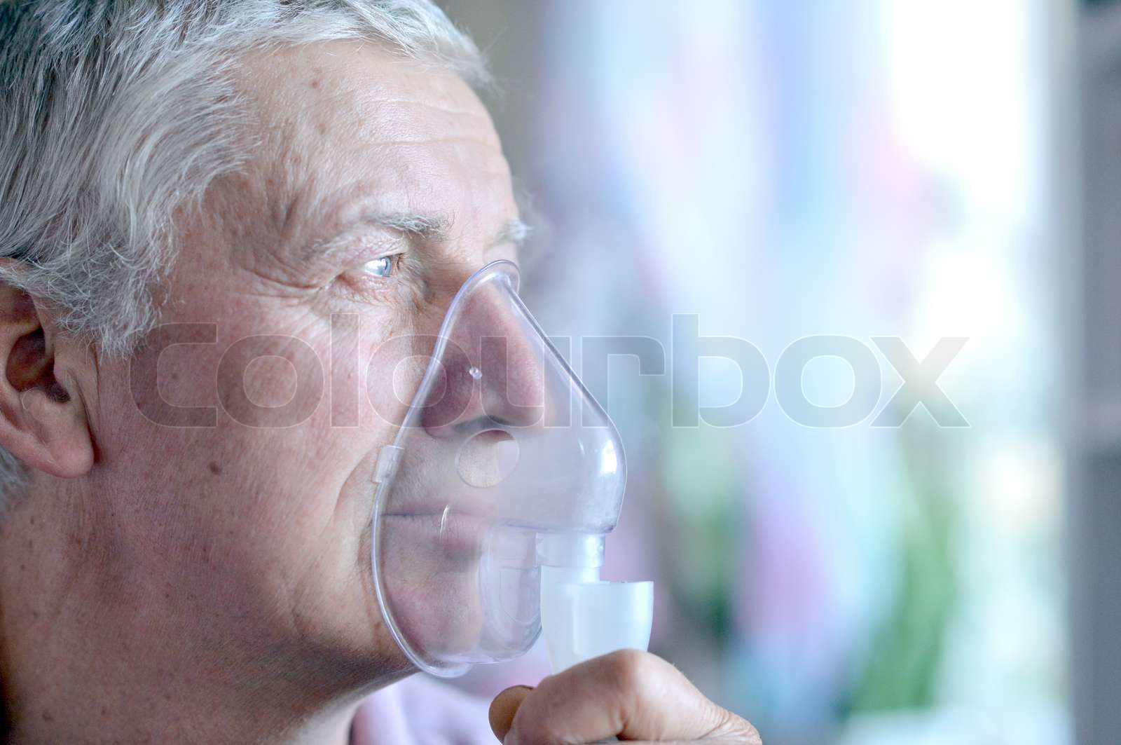 man making inhalation | Stock image | Colourbox