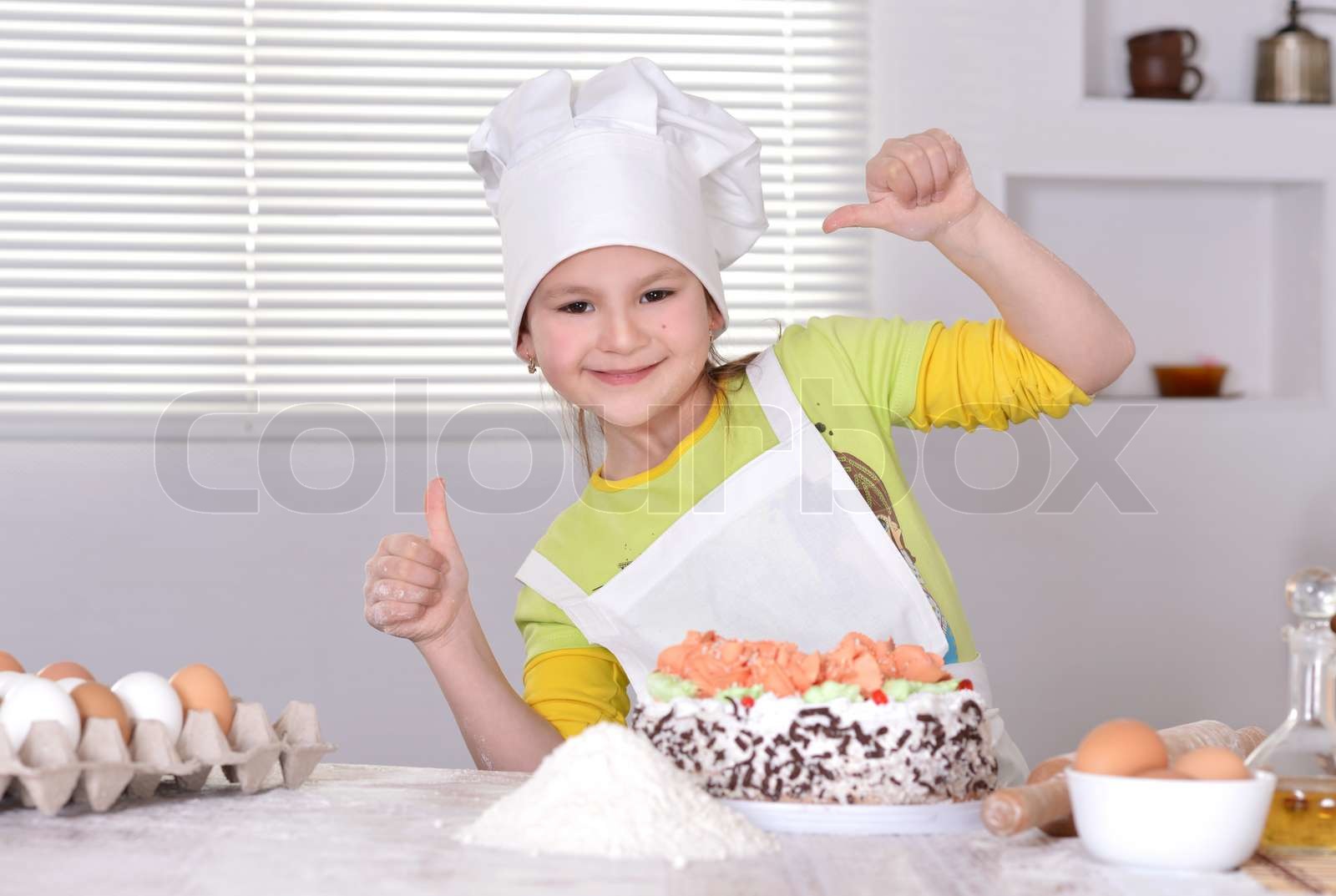 little girl in chef hat | Stock image | Colourbox
