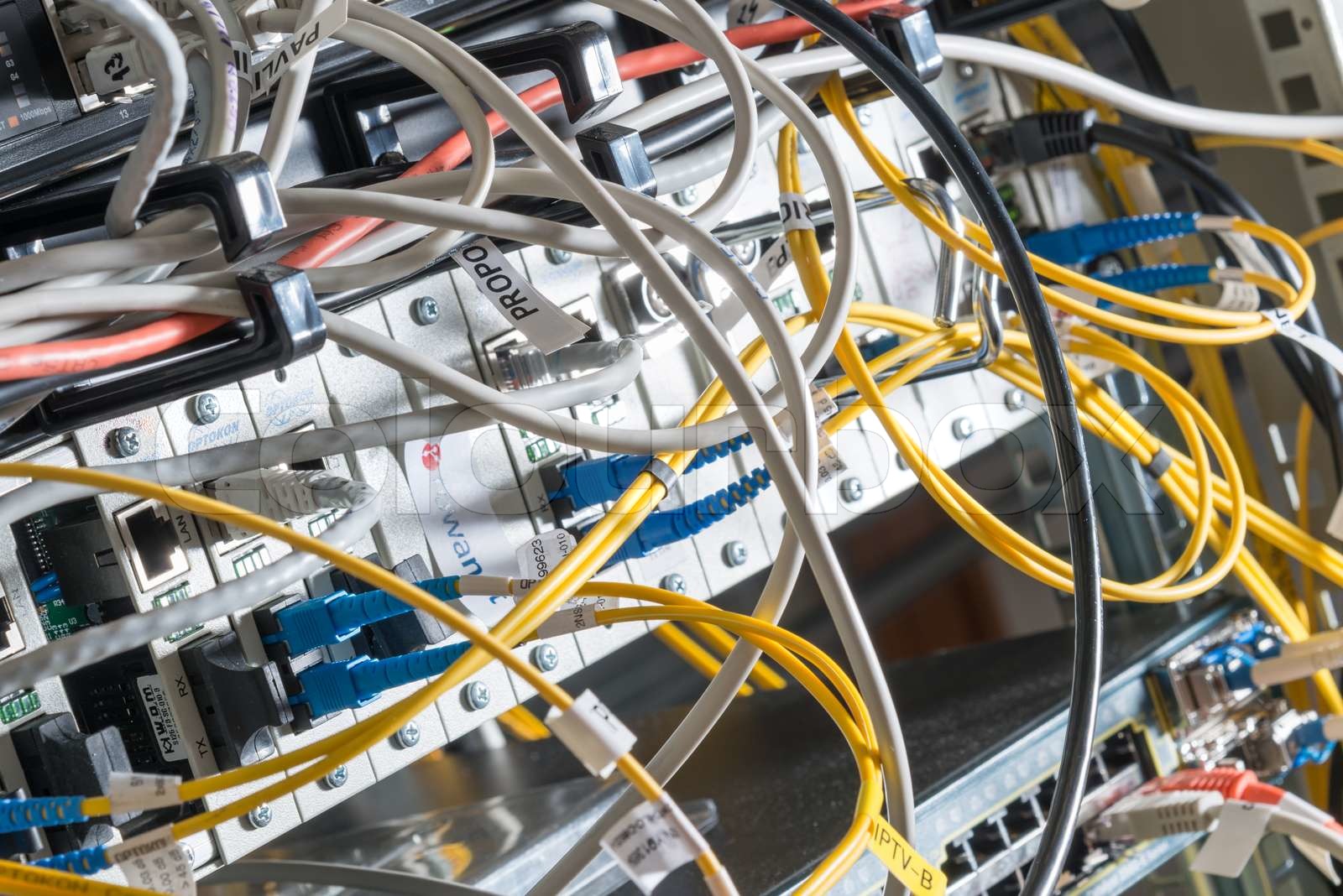 server with fiber opticcables in data center | Stock image | Colourbox