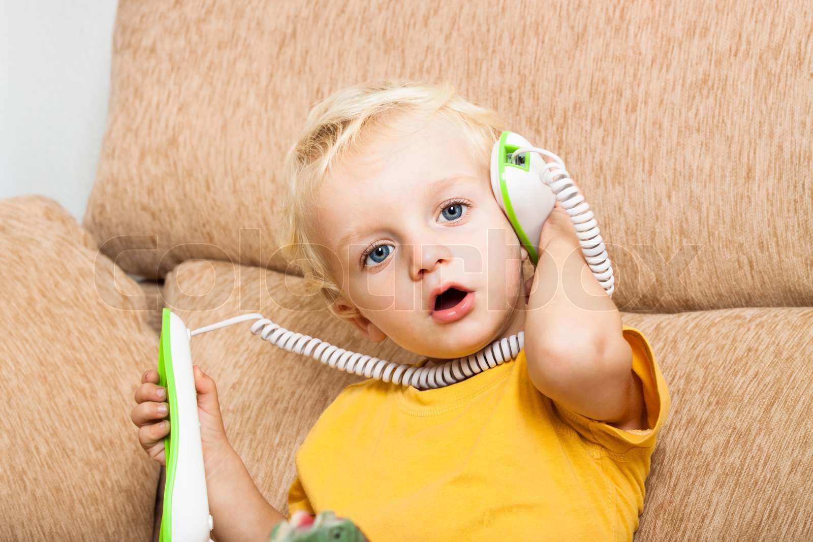 Child phone call | Stock image | Colourbox