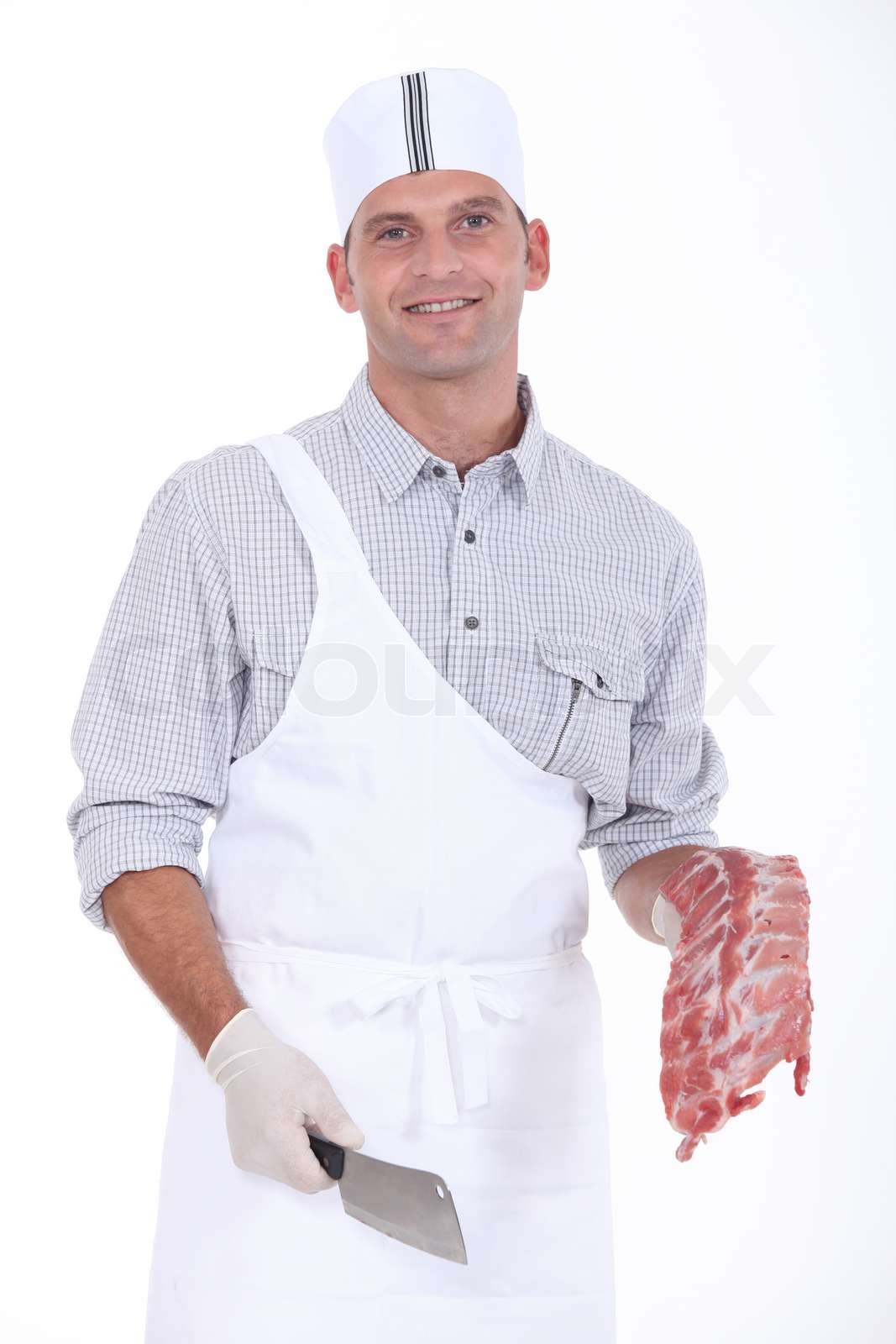 butcher with chops | Stock image | Colourbox
