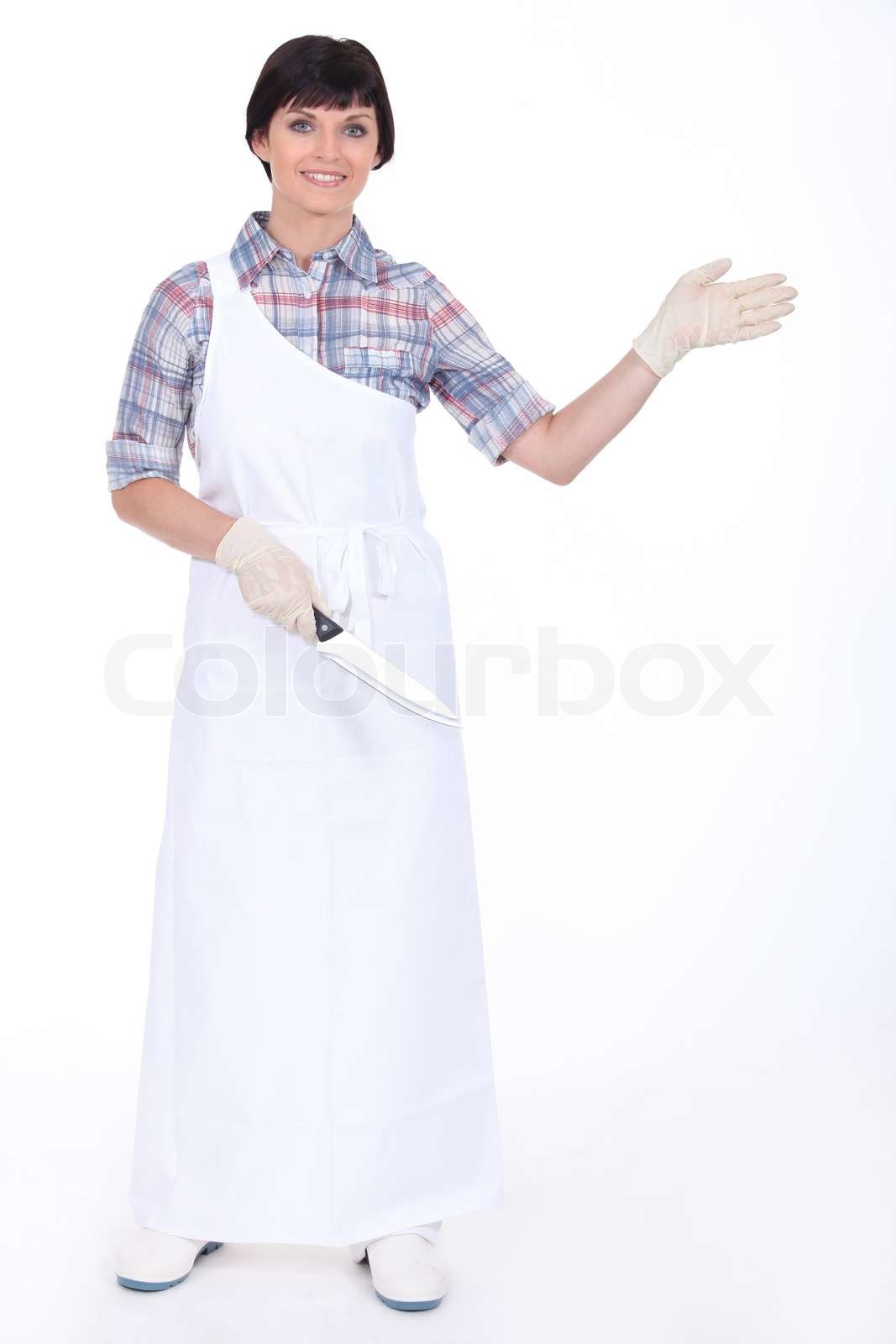 woman wearing a butcher's uniform | Stock image | Colourbox