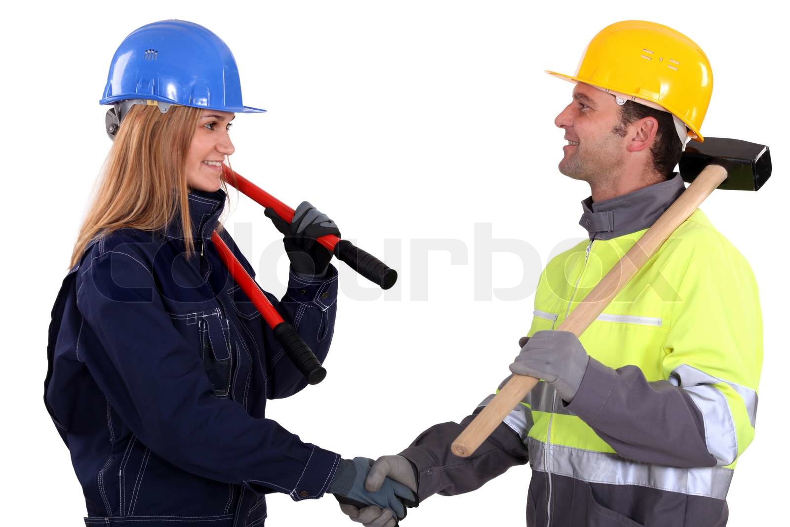 two construction workers shaking hands | Stock image | Colourbox