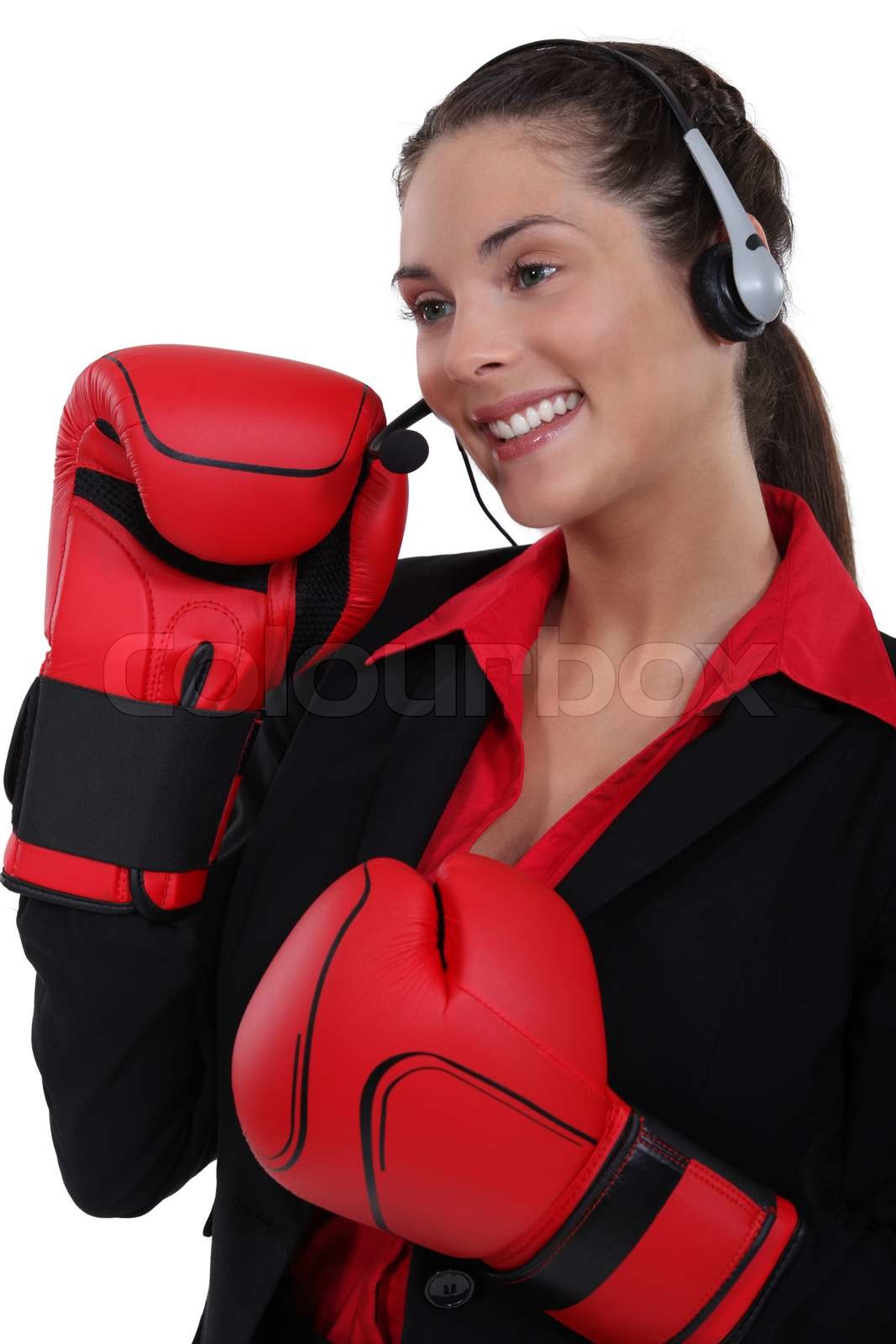 Customer service agent wearing boxing gloves | Stock image | Colourbox