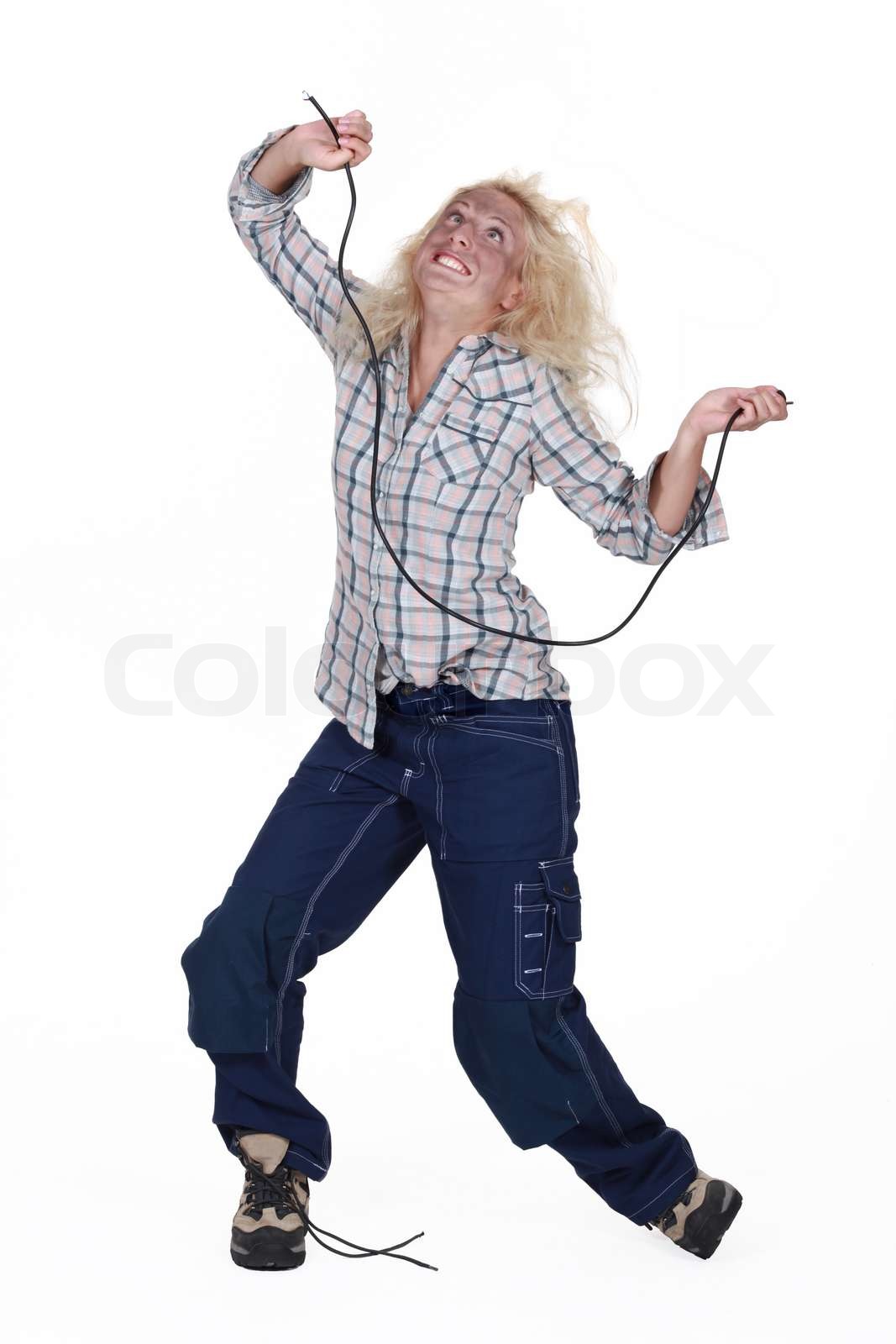 Woman being electrocuted | Stock image | Colourbox