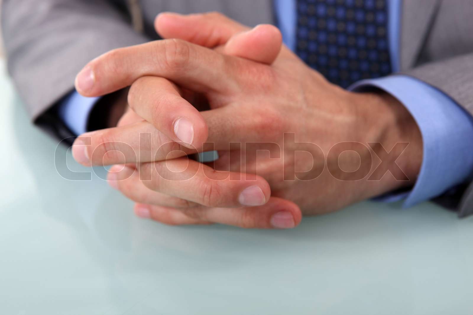 Human hands clasped | Stock image | Colourbox