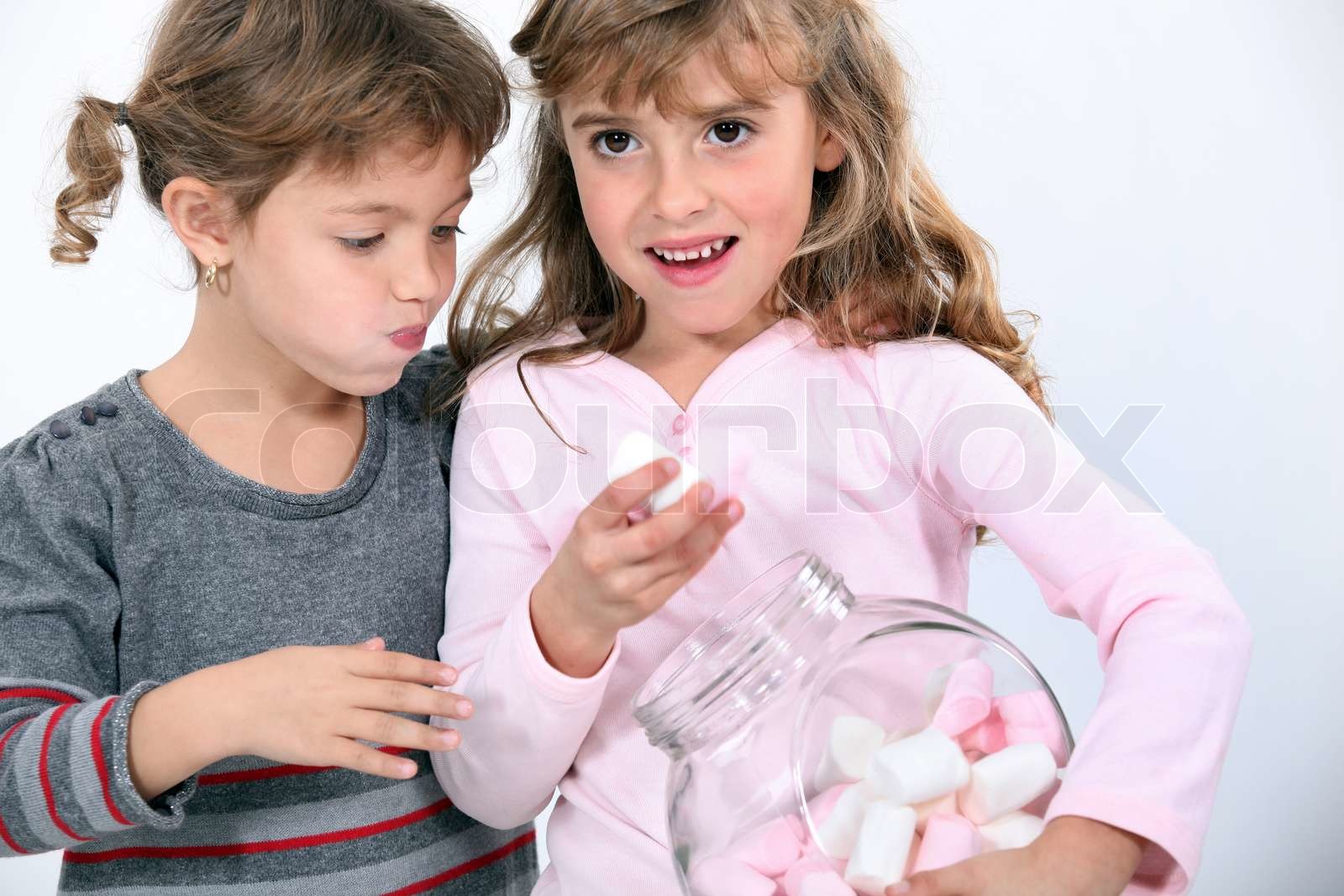 Children with the sweet jar | Stock image | Colourbox