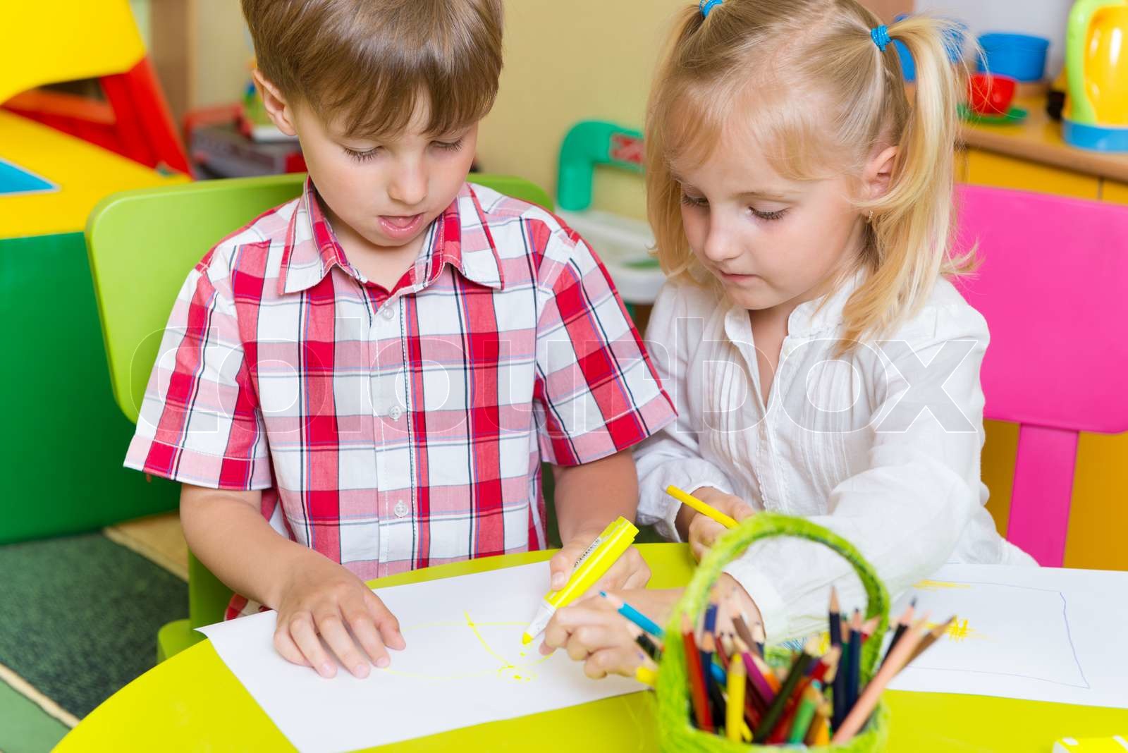 Two cute little prescool kids drawing | Stock image | Colourbox