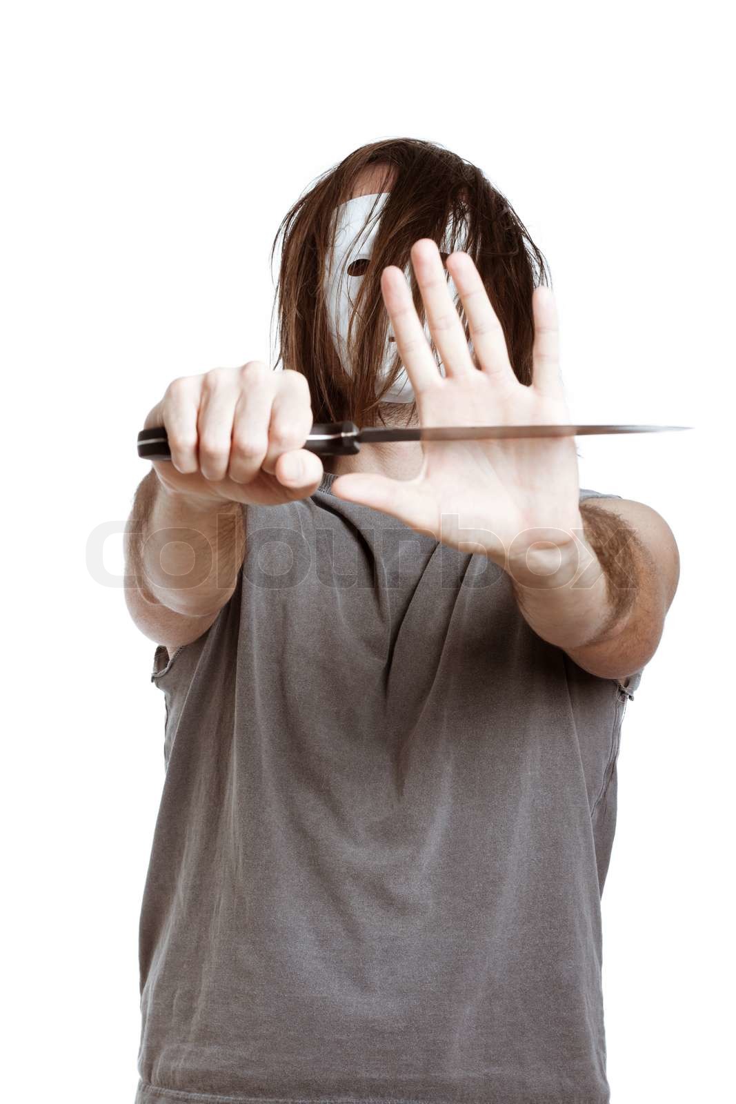 Scary psycho horror man with knife | Stock image | Colourbox