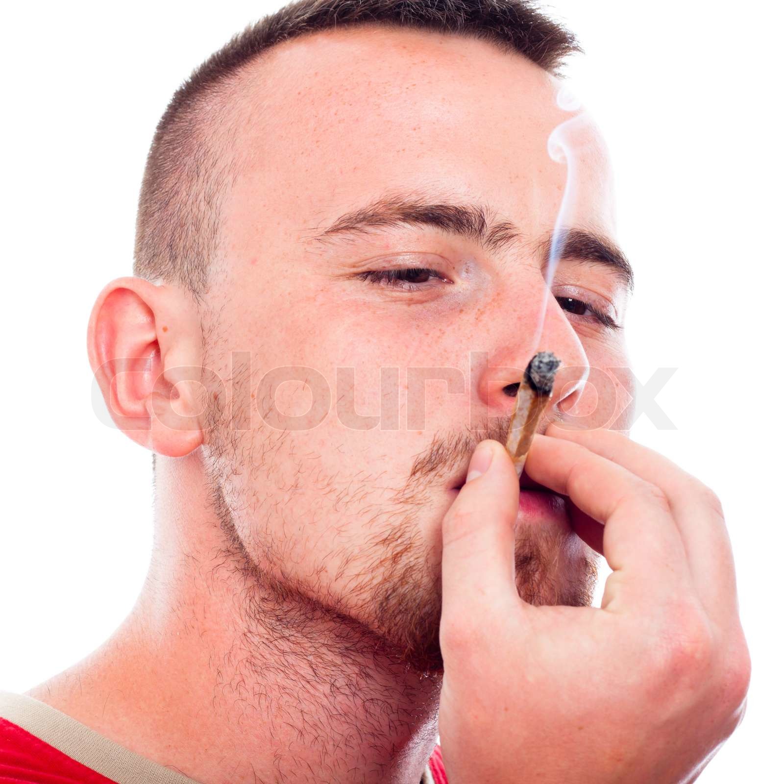 Junger Mann Rauchen Haschisch | Stock Bild | Colourbox