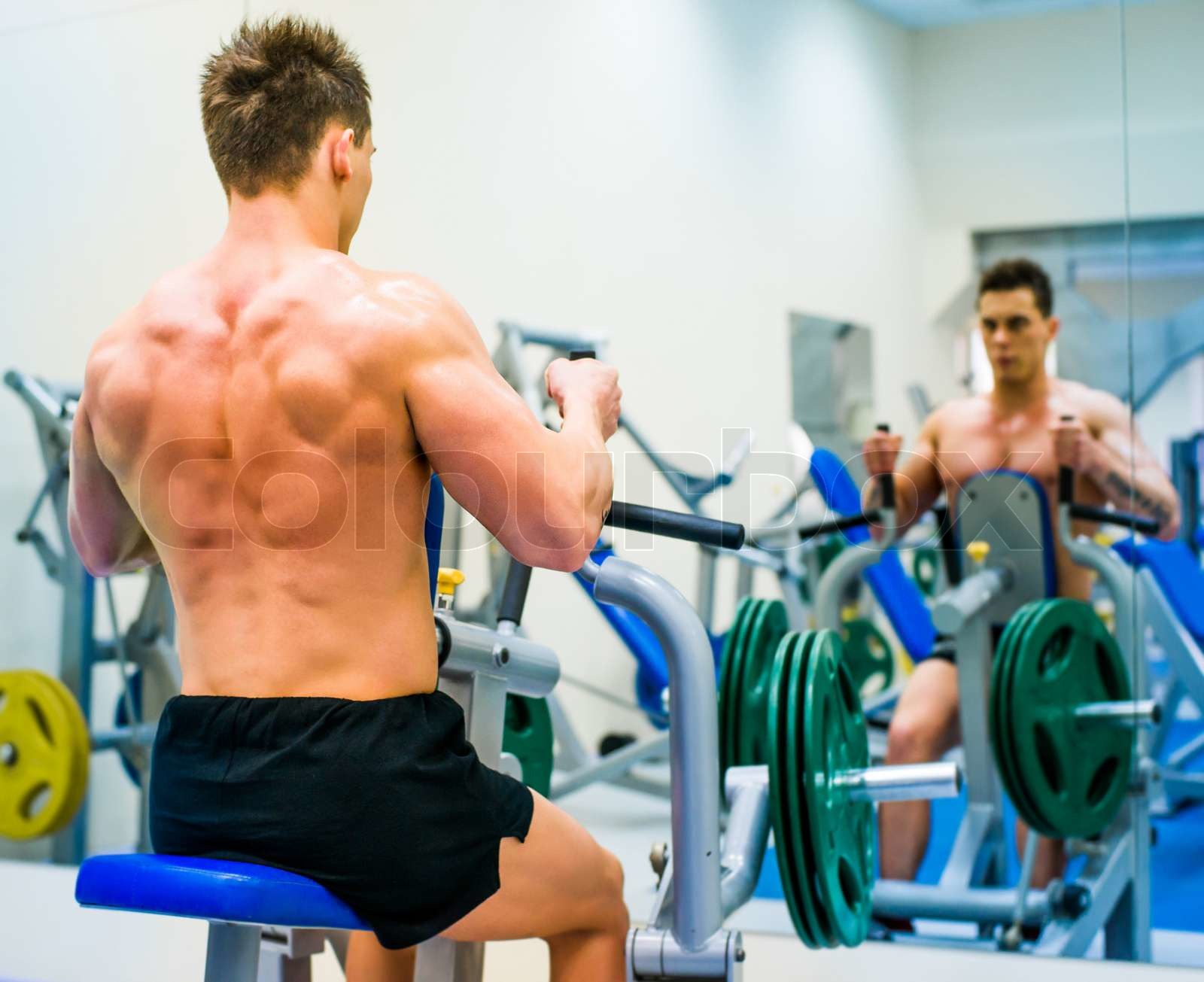 bodybuilder with simulator | Stock image | Colourbox