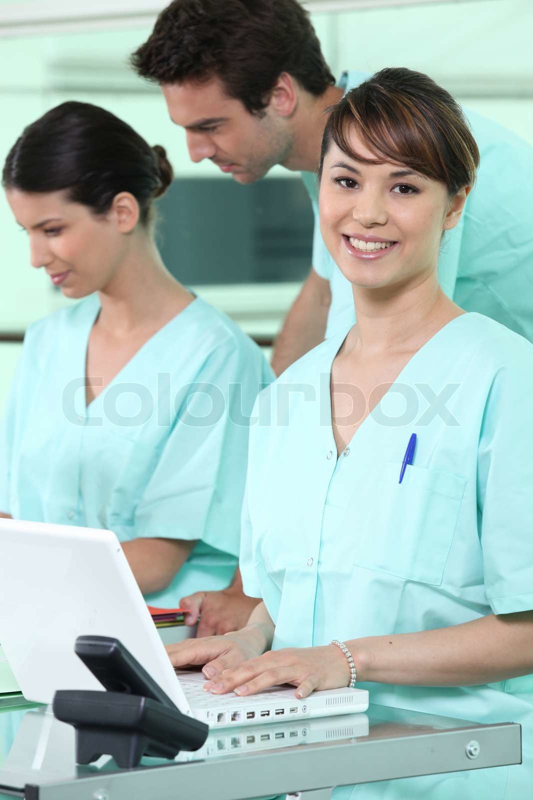 Nurses using a computer | Stock image | Colourbox