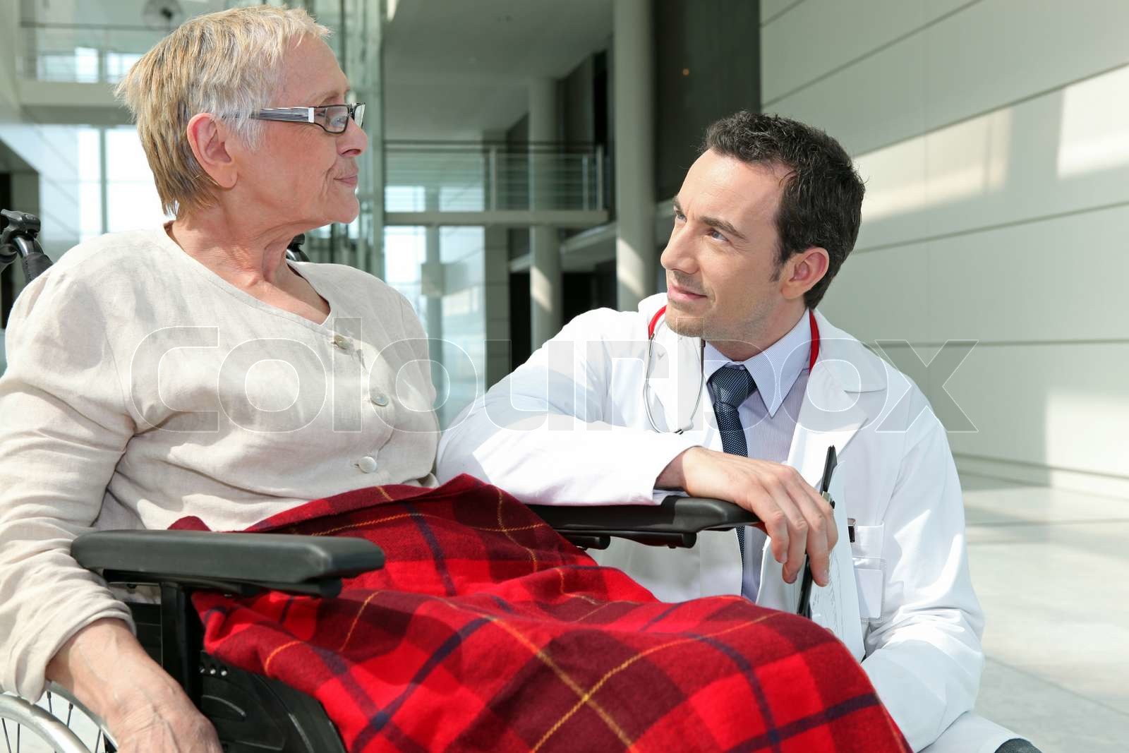 Doctor answering questions | Stock image | Colourbox