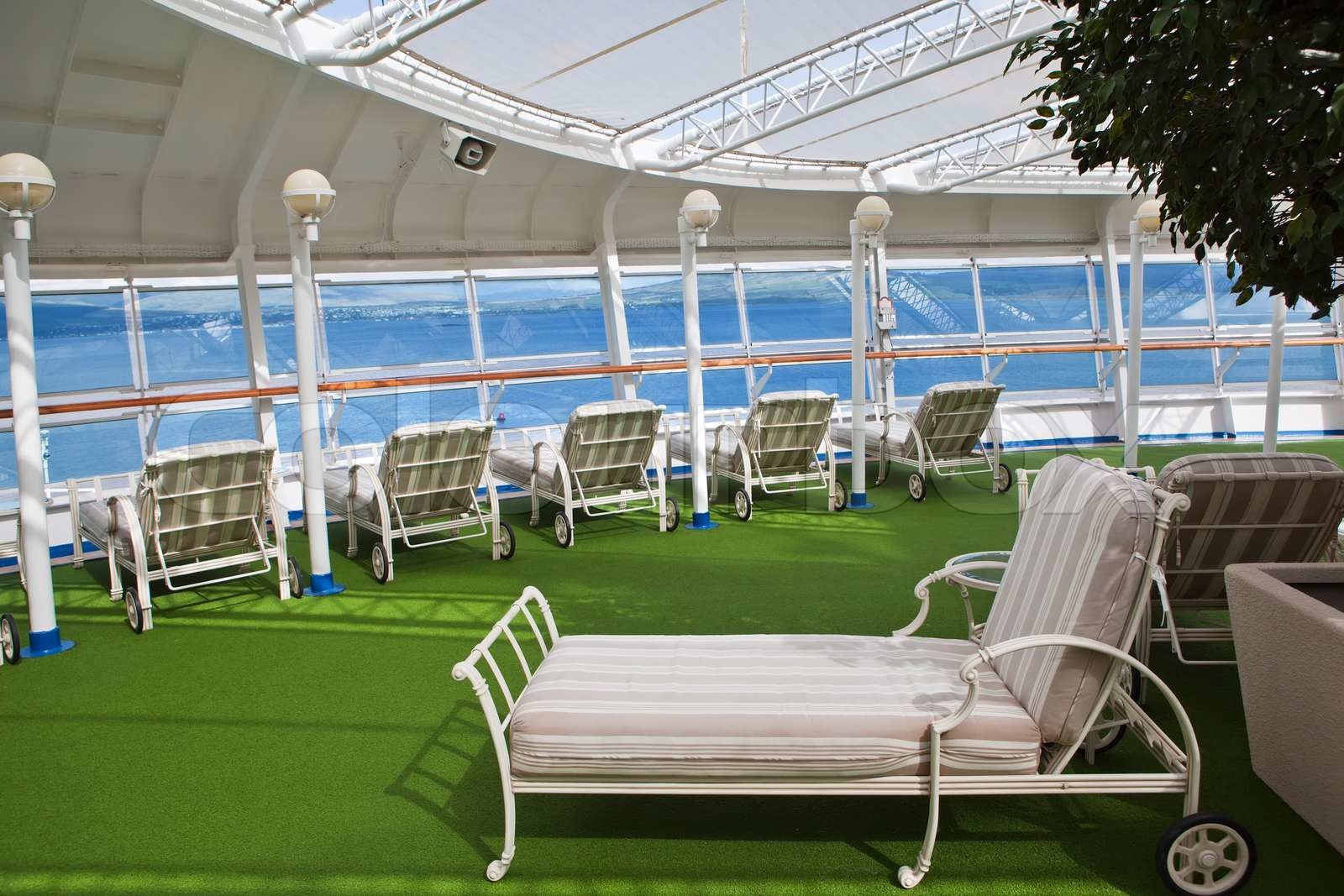 Sunbeds on sundeck of the cruise ship | Stock image | Colourbox