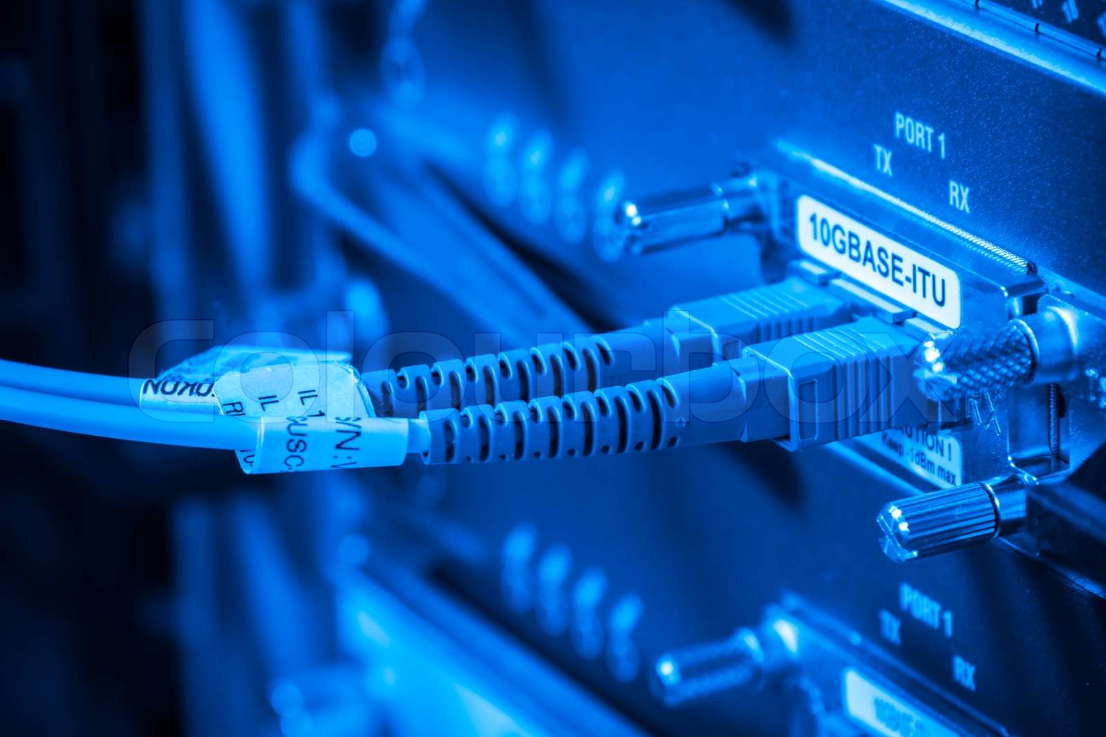 server with fiber opticcables in data center | Stock image | Colourbox