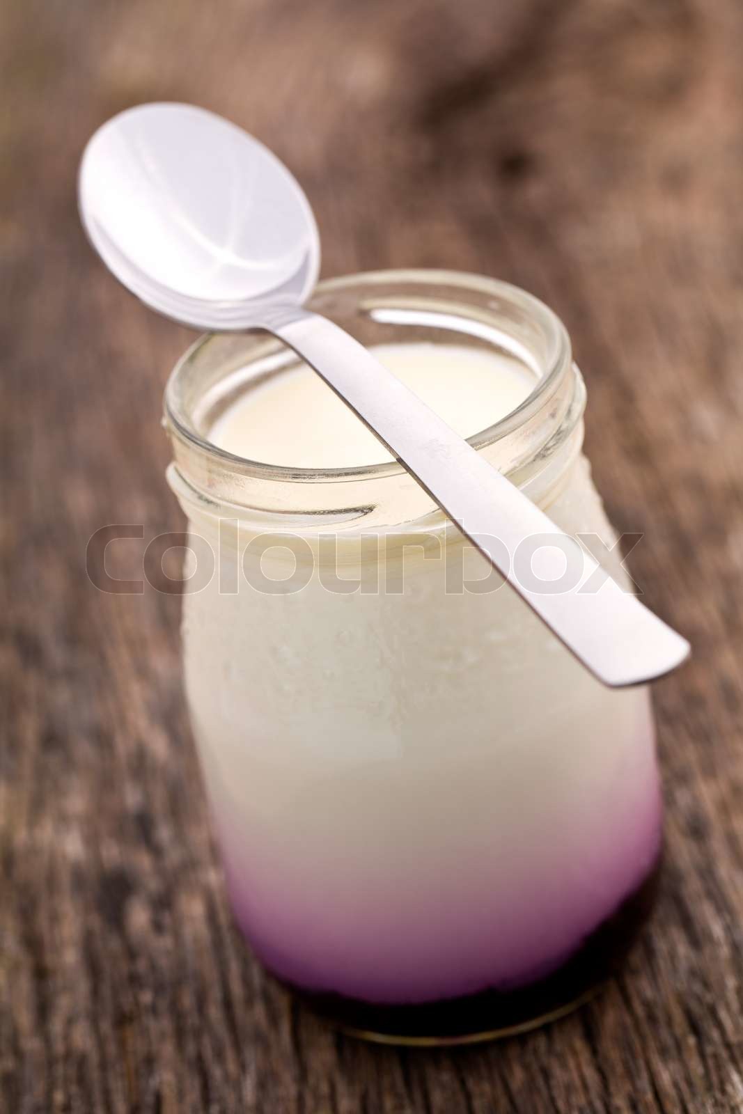 yogurt in glass jar | Stock image | Colourbox