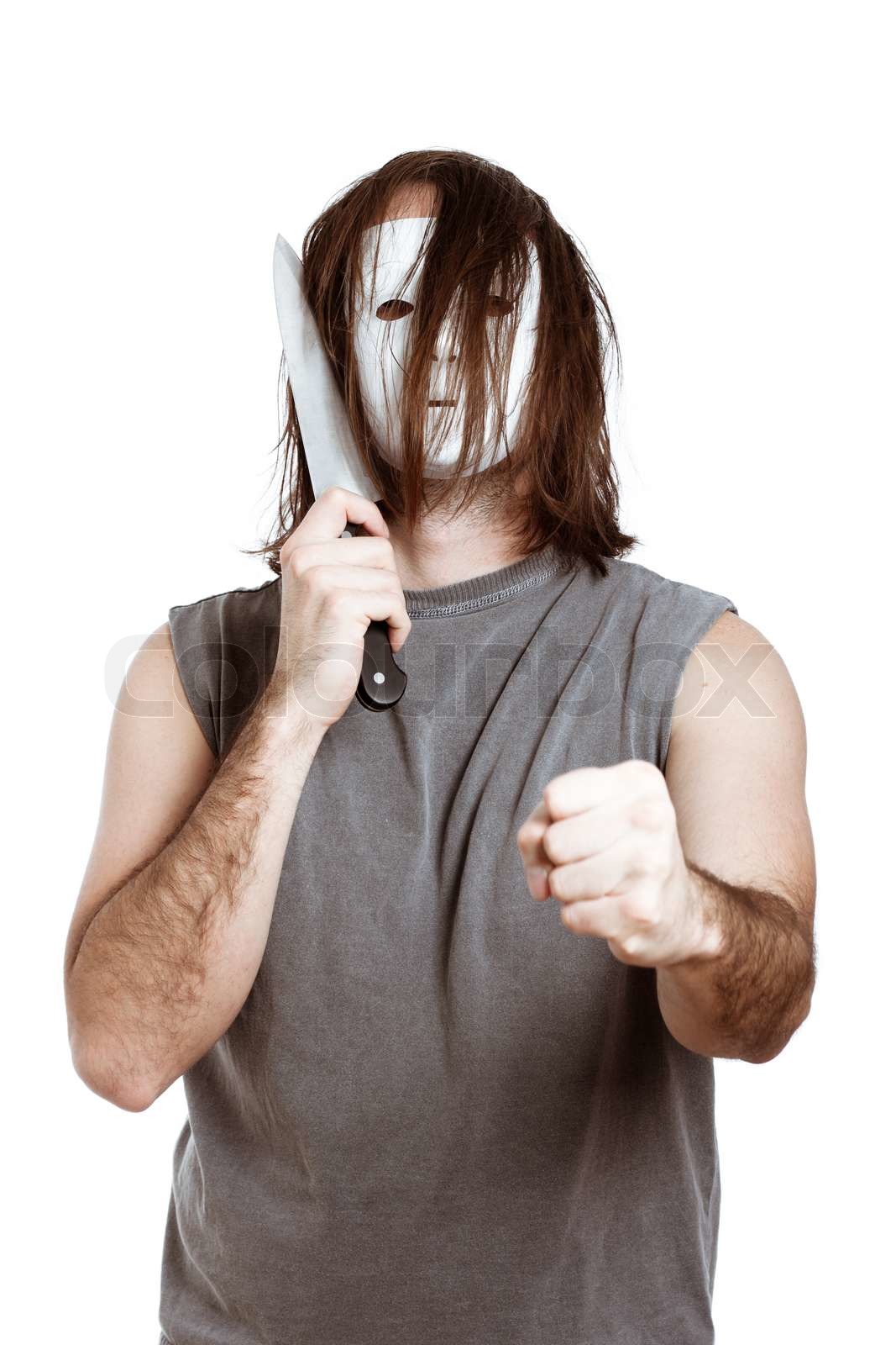 Angry scary man with knife | Stock image | Colourbox