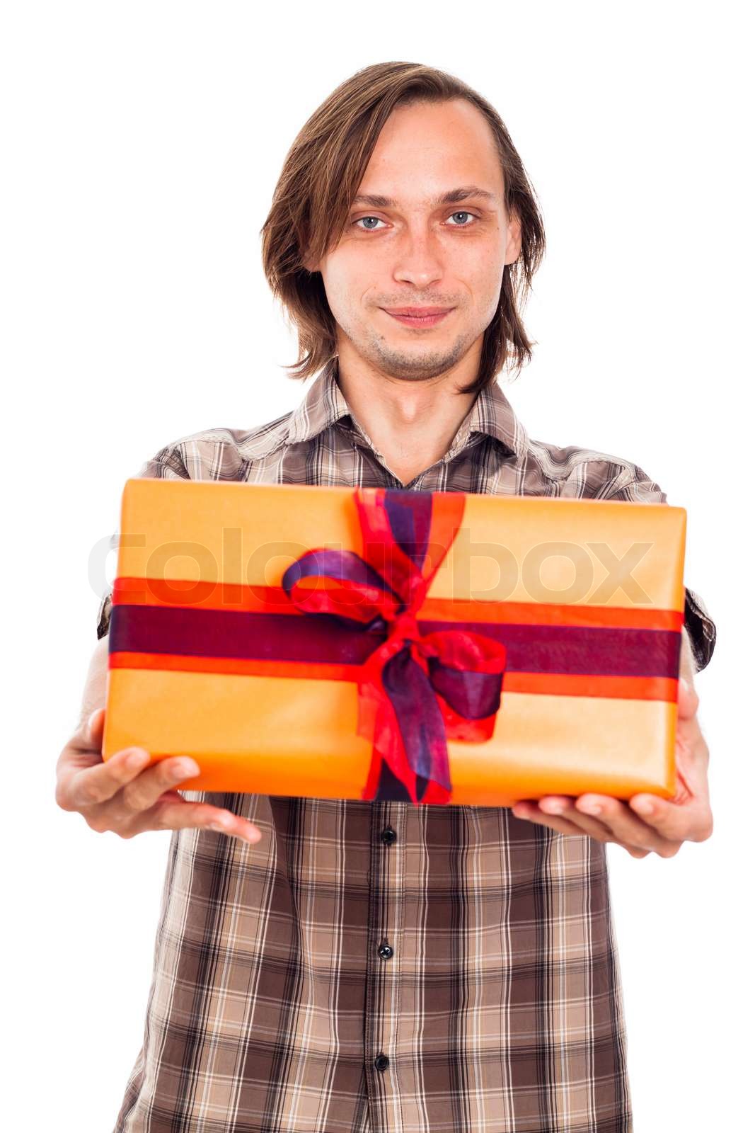 Man giving gift | Stock image | Colourbox