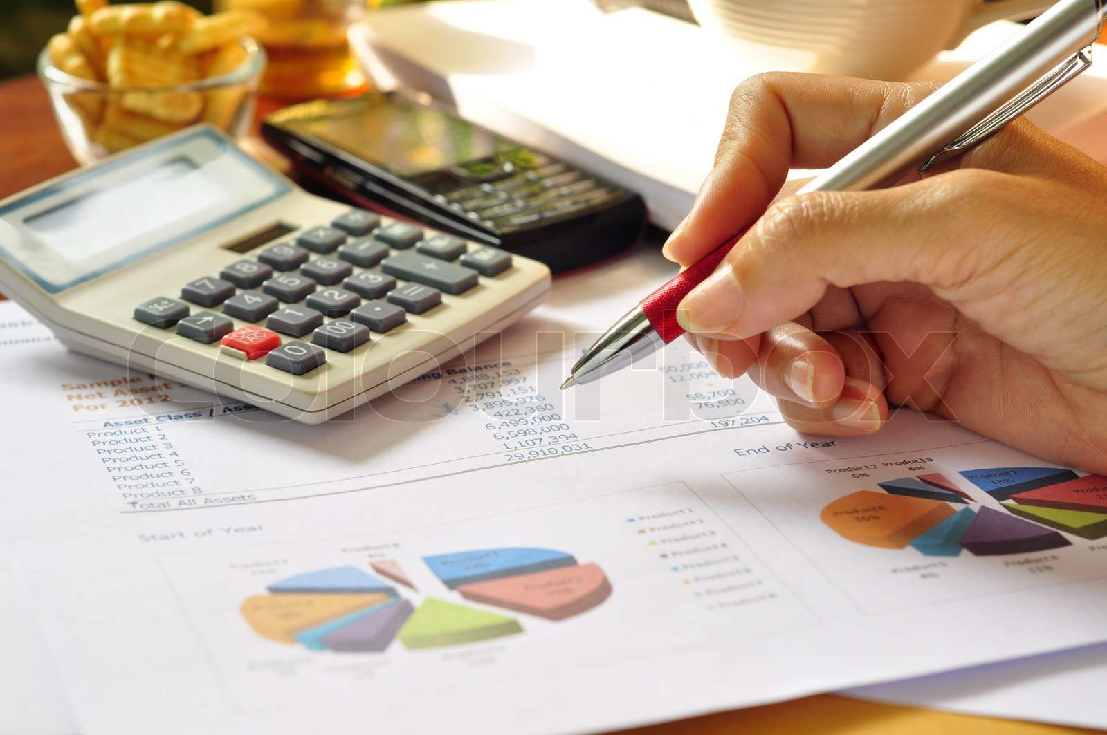Financial statements and line chart | Stock image | Colourbox