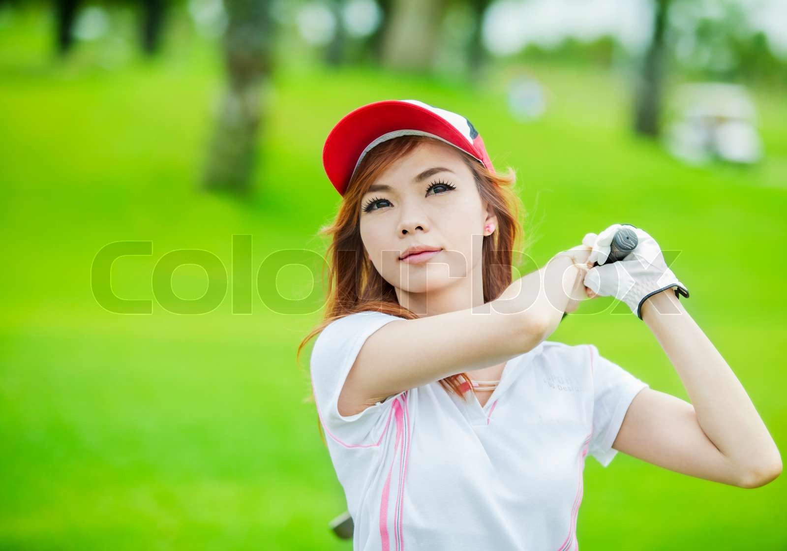 lady playing golf | Stock image | Colourbox