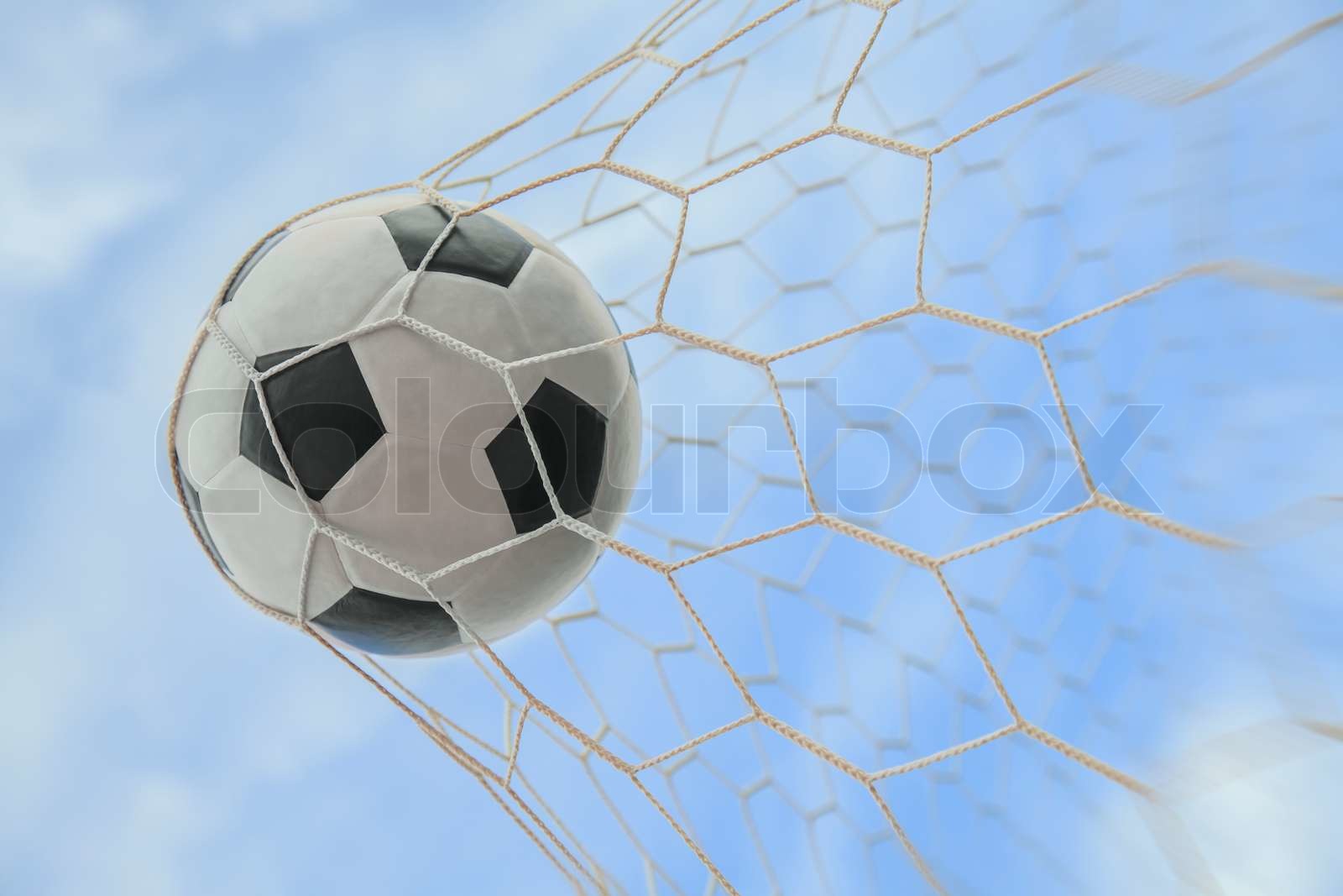 soccer ball in goal | Stock image | Colourbox