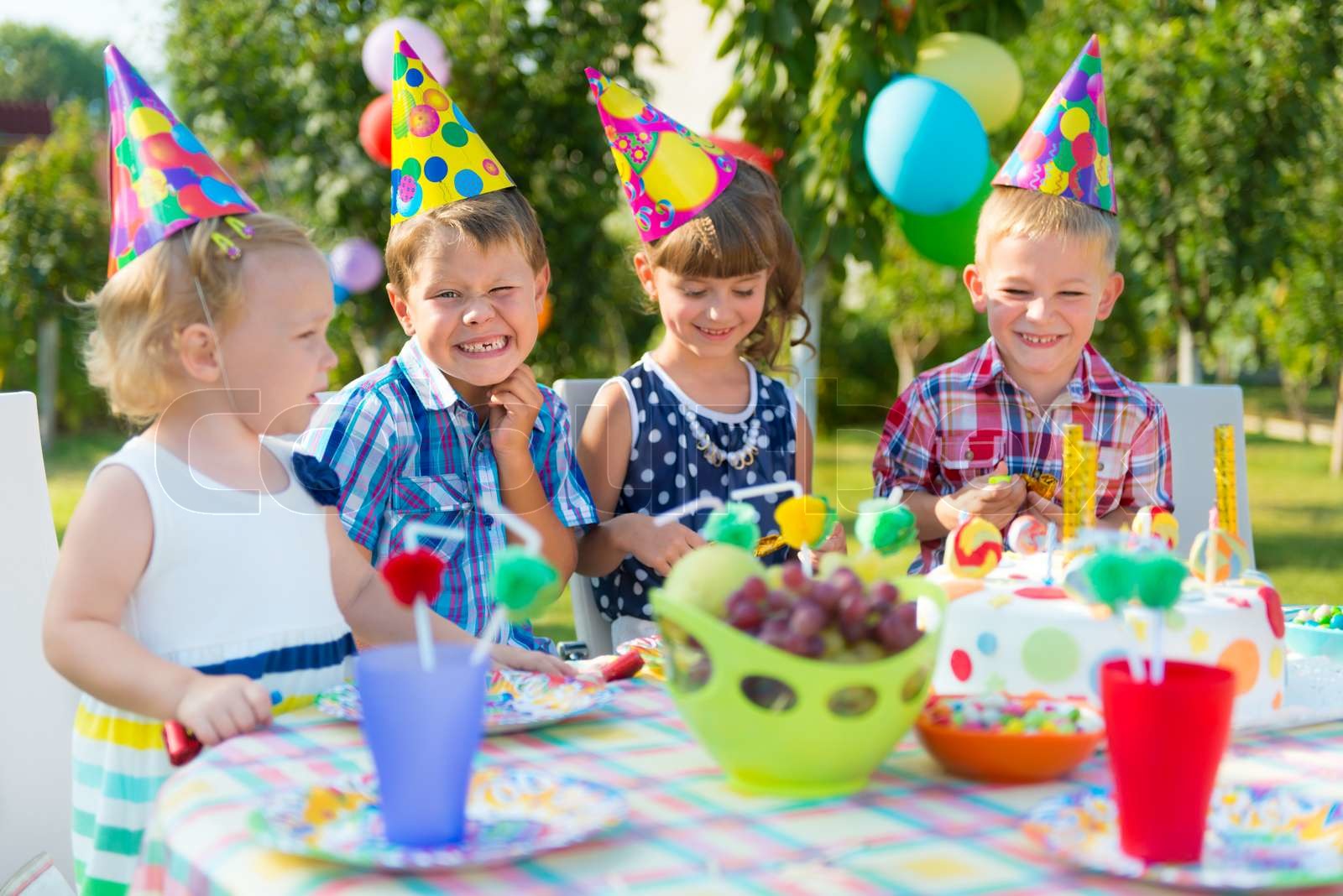 Group of kids having fun at birthday party | Stock image | Colourbox