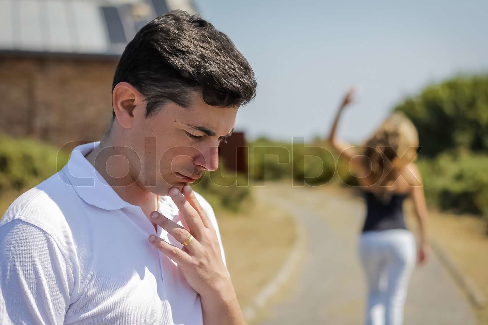 unhappy man and angry woman leaving after quarrel | Stock image | Colourbox