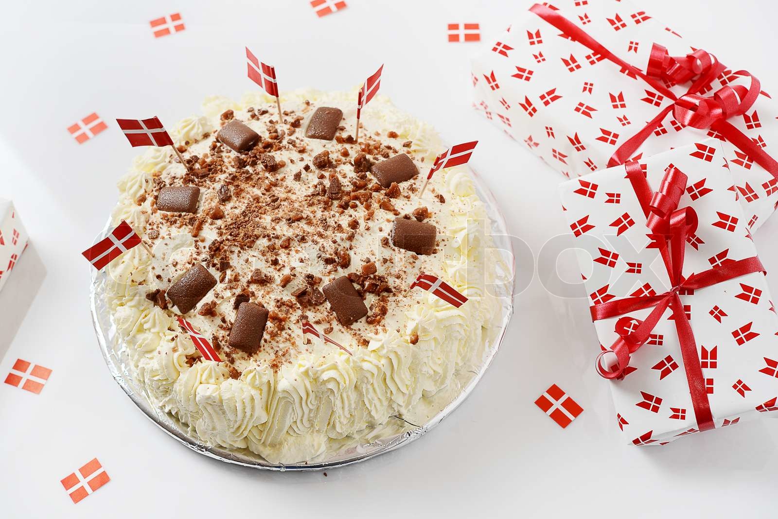 Typical Danish Layer cake with flags and presents | Stock image | Colourbox