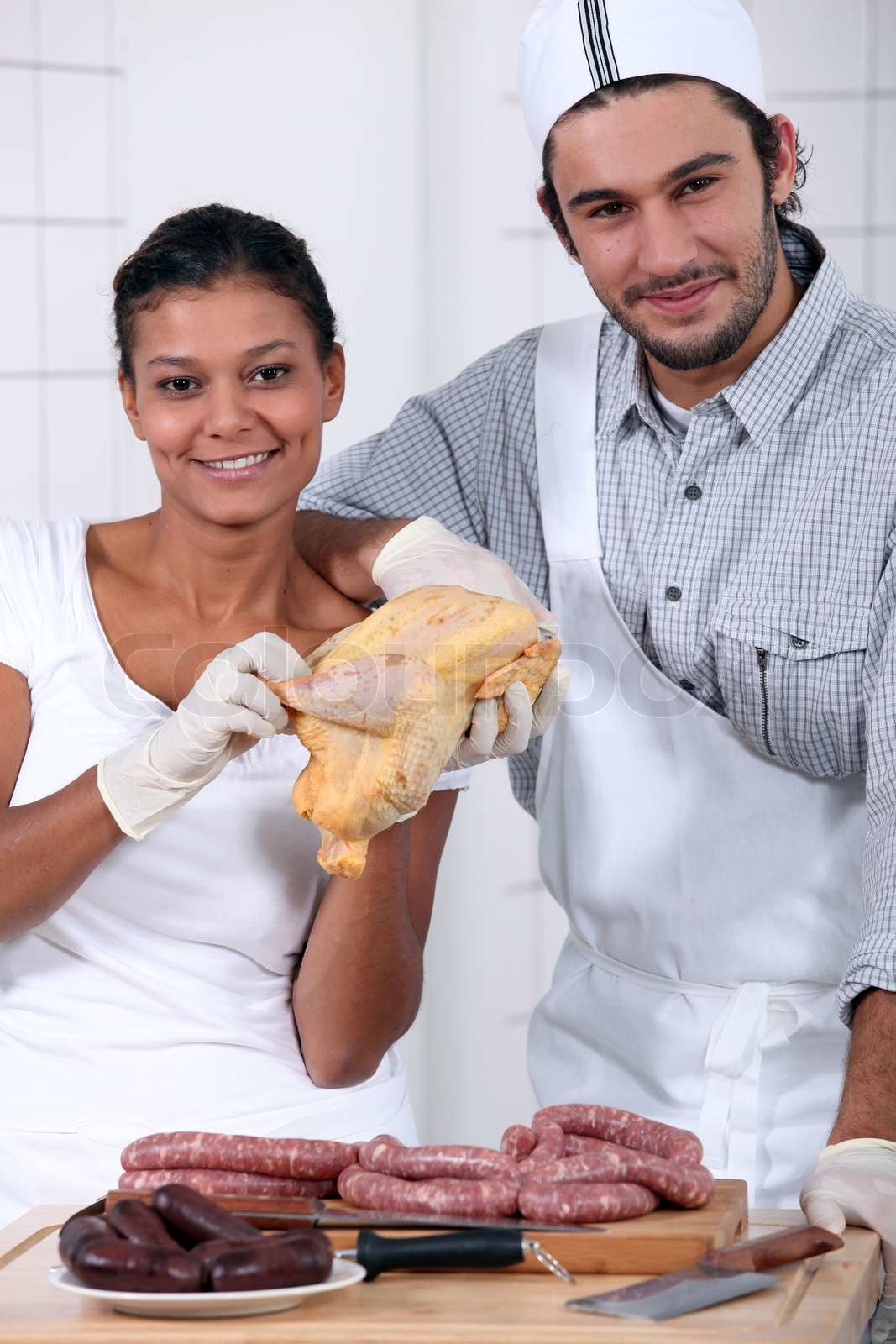 a butcher and his wife/assistant | Stock image | Colourbox