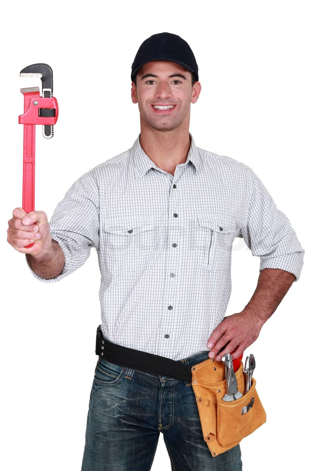 Man with an adjustable wrench | Stock image | Colourbox