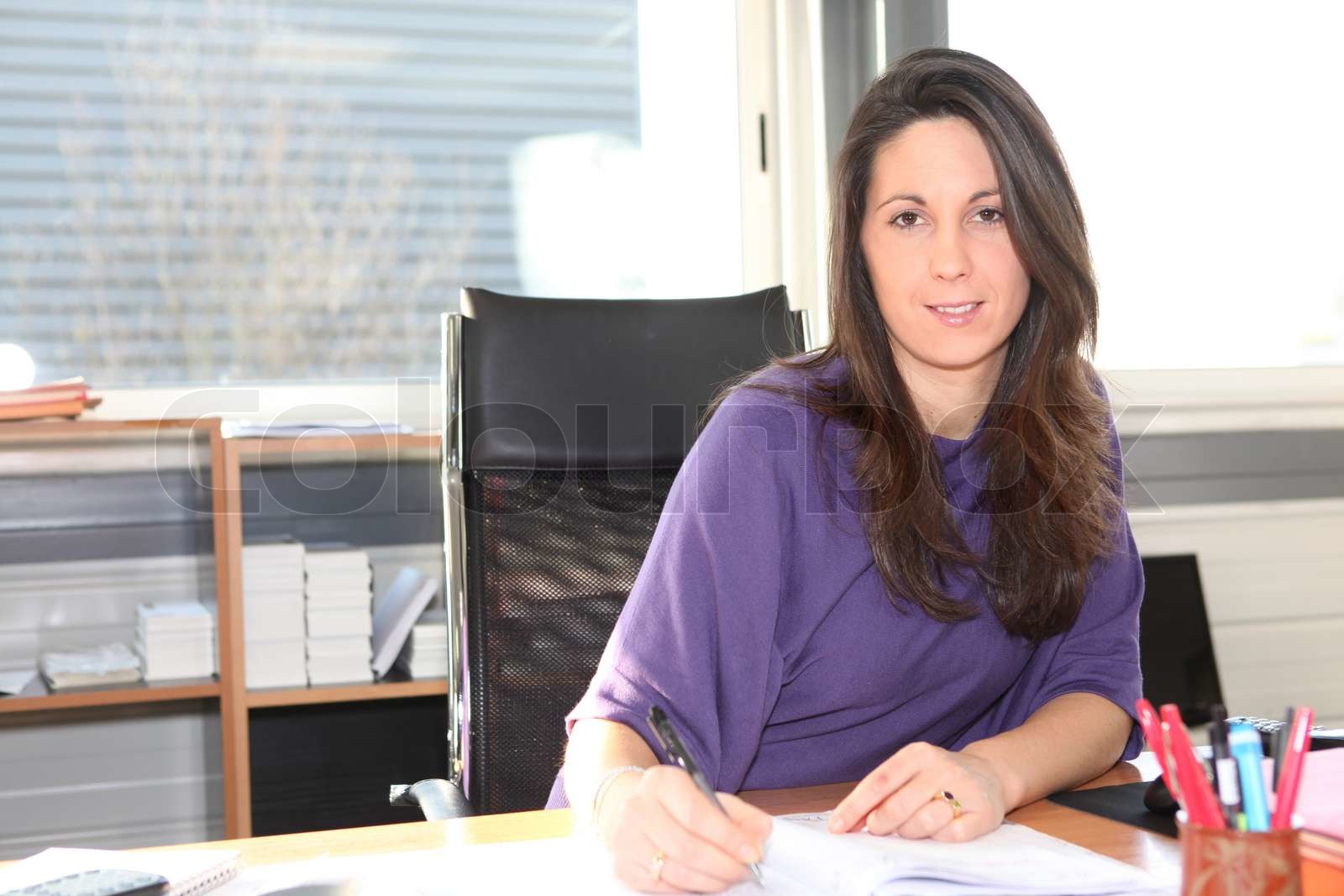 a female employee at work | Stock image | Colourbox
