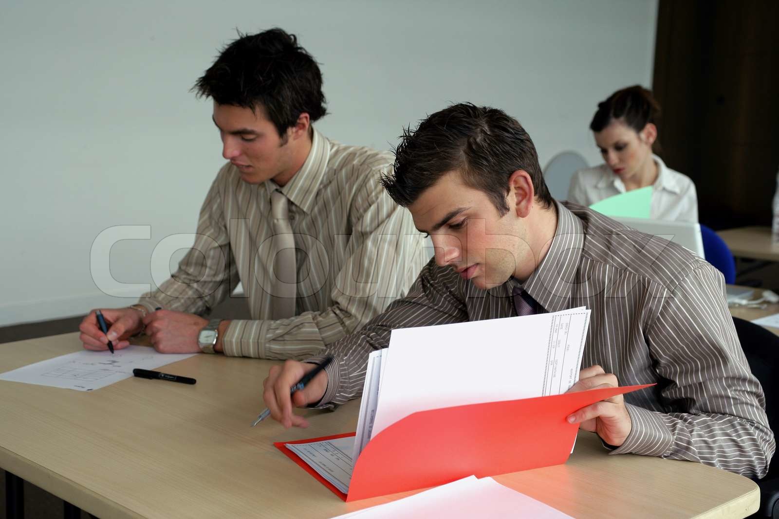 Students hard at work in class | Stock image | Colourbox